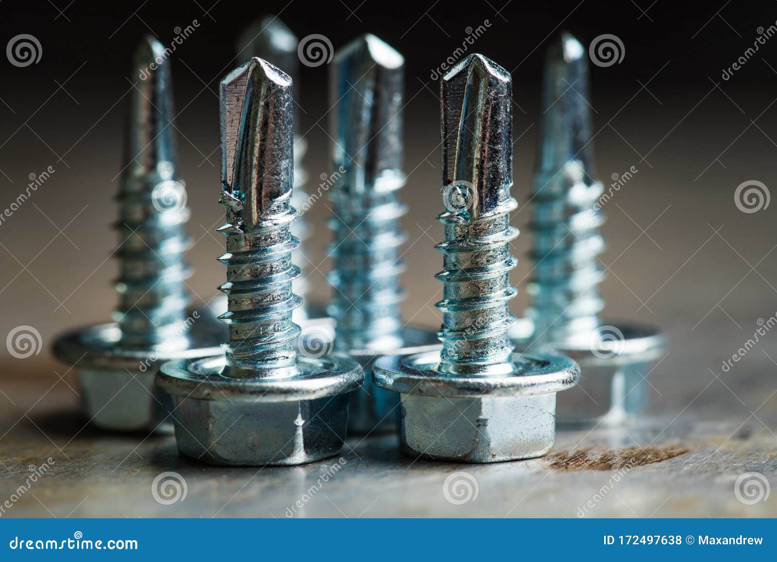 Tapping Made of Steel on the Dark Rustic Background Stock Photo - Image ...