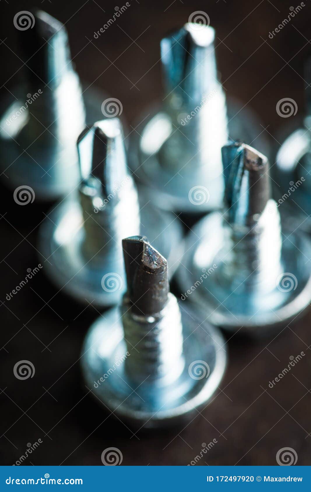 Tapping Made of Steel on the Dark Rustic Background Stock Photo - Image ...