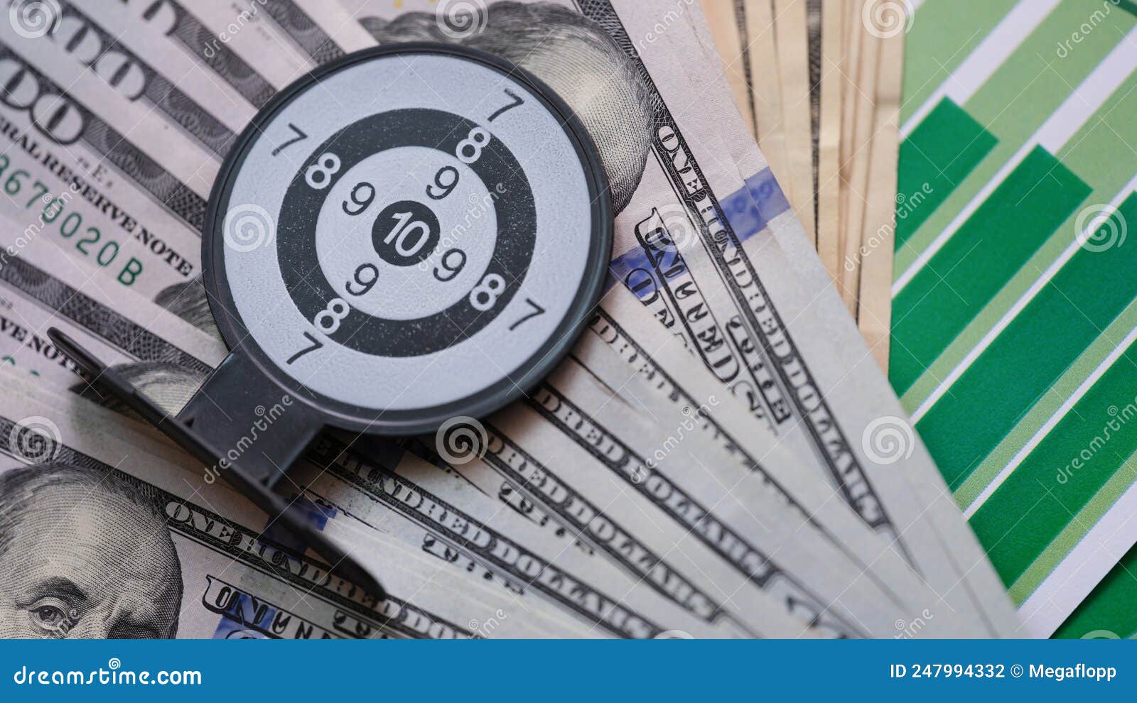 Target Lying on Dollar Bills and Documents with Graphs Closeup Stock ...
