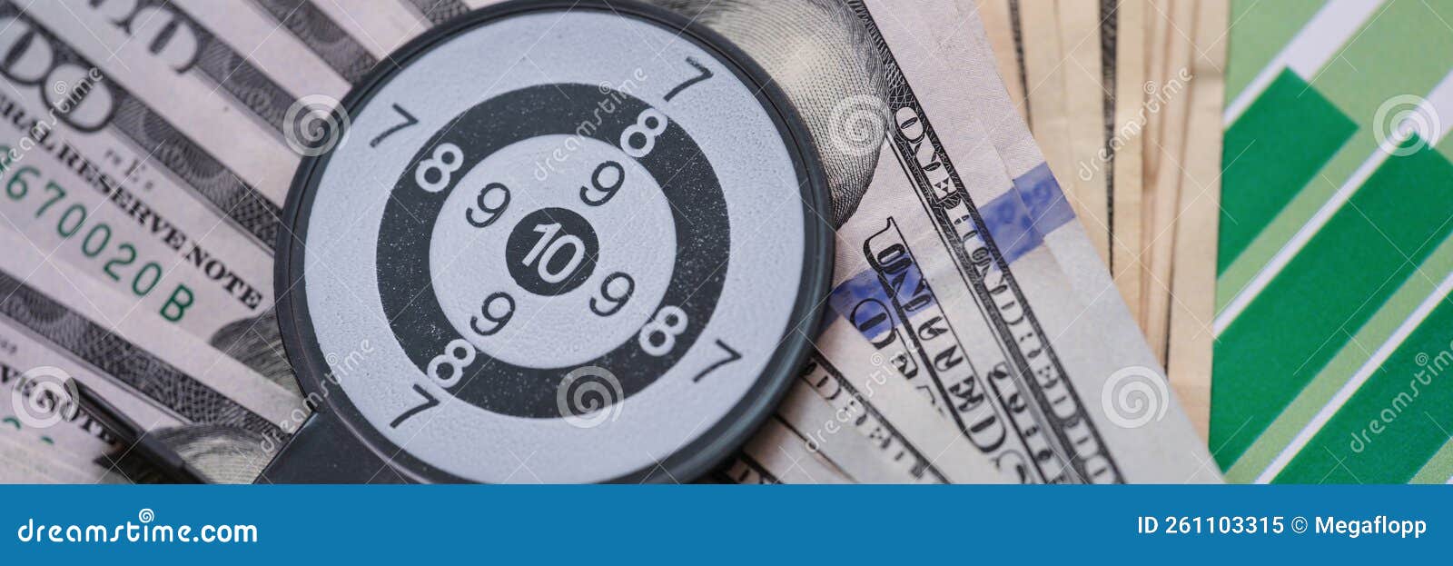 Target Lying on Dollar Bills and Documents with Graphs Closeup Stock ...