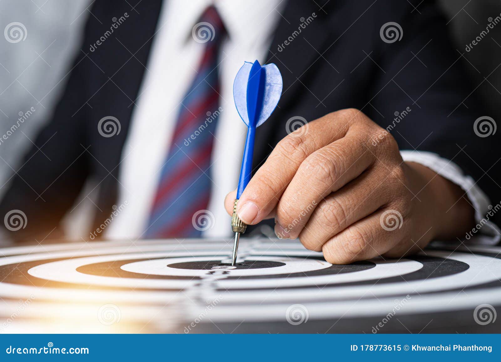 Target and Strategy Concept, Businessman Focus To Aim by Throwing Dart ...