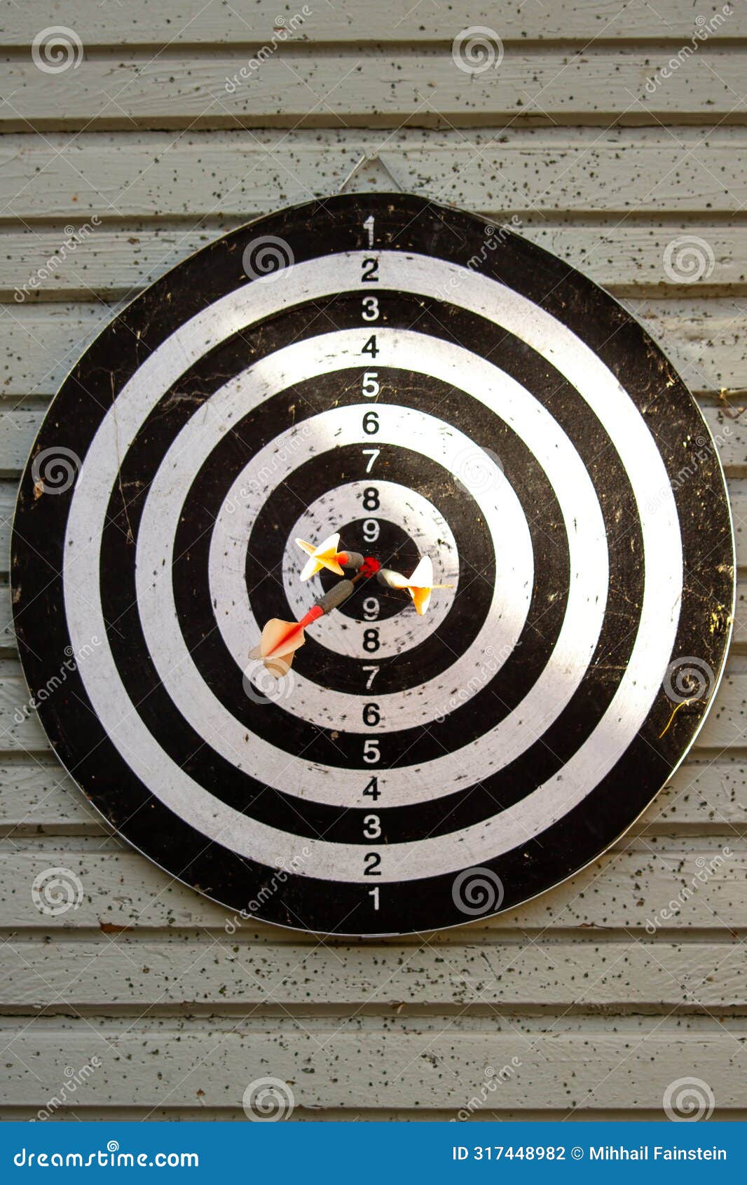 Target and three darts stock photo. Image of dart, target - 317448982