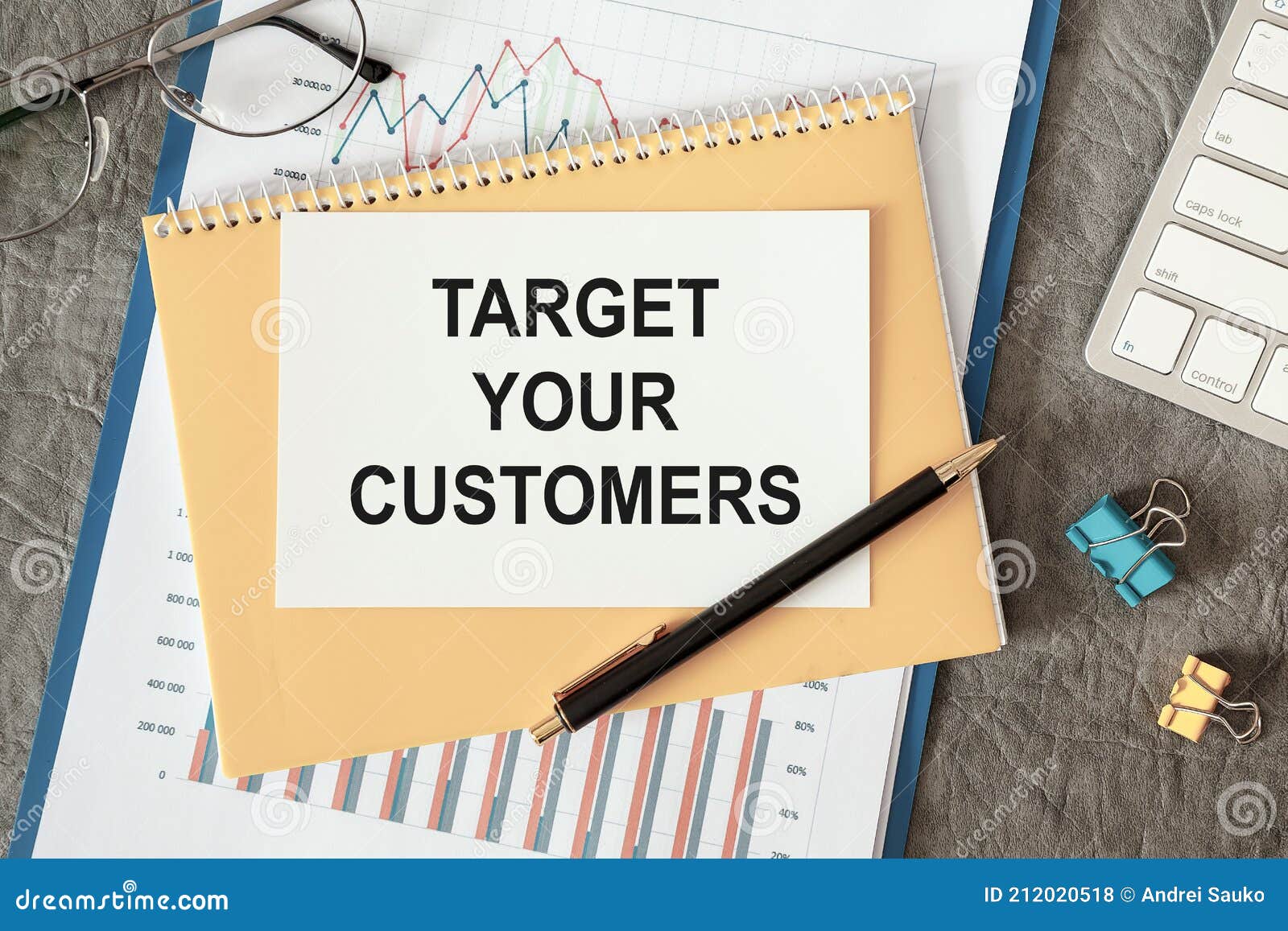 Target Your Customers is Written in a Document on the Office Desk Stock ...