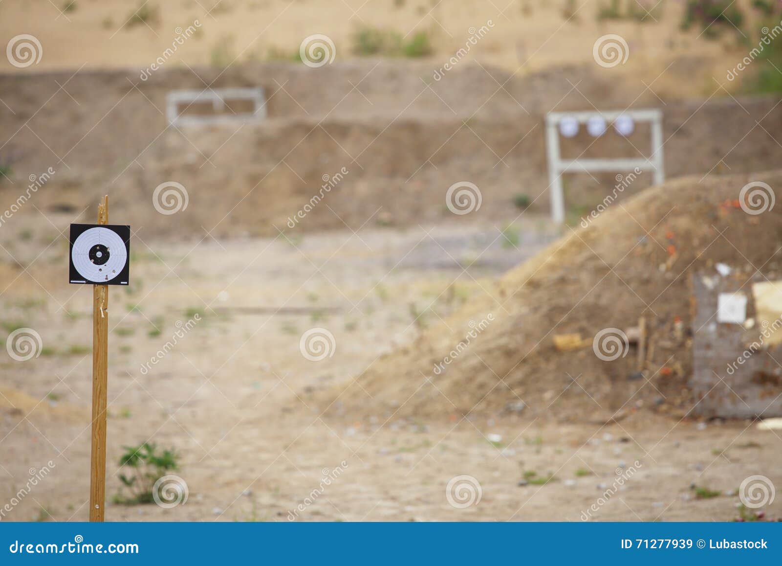 Shooting Range. Rear View Of Men Shooting With Gun In Shooting Range ...