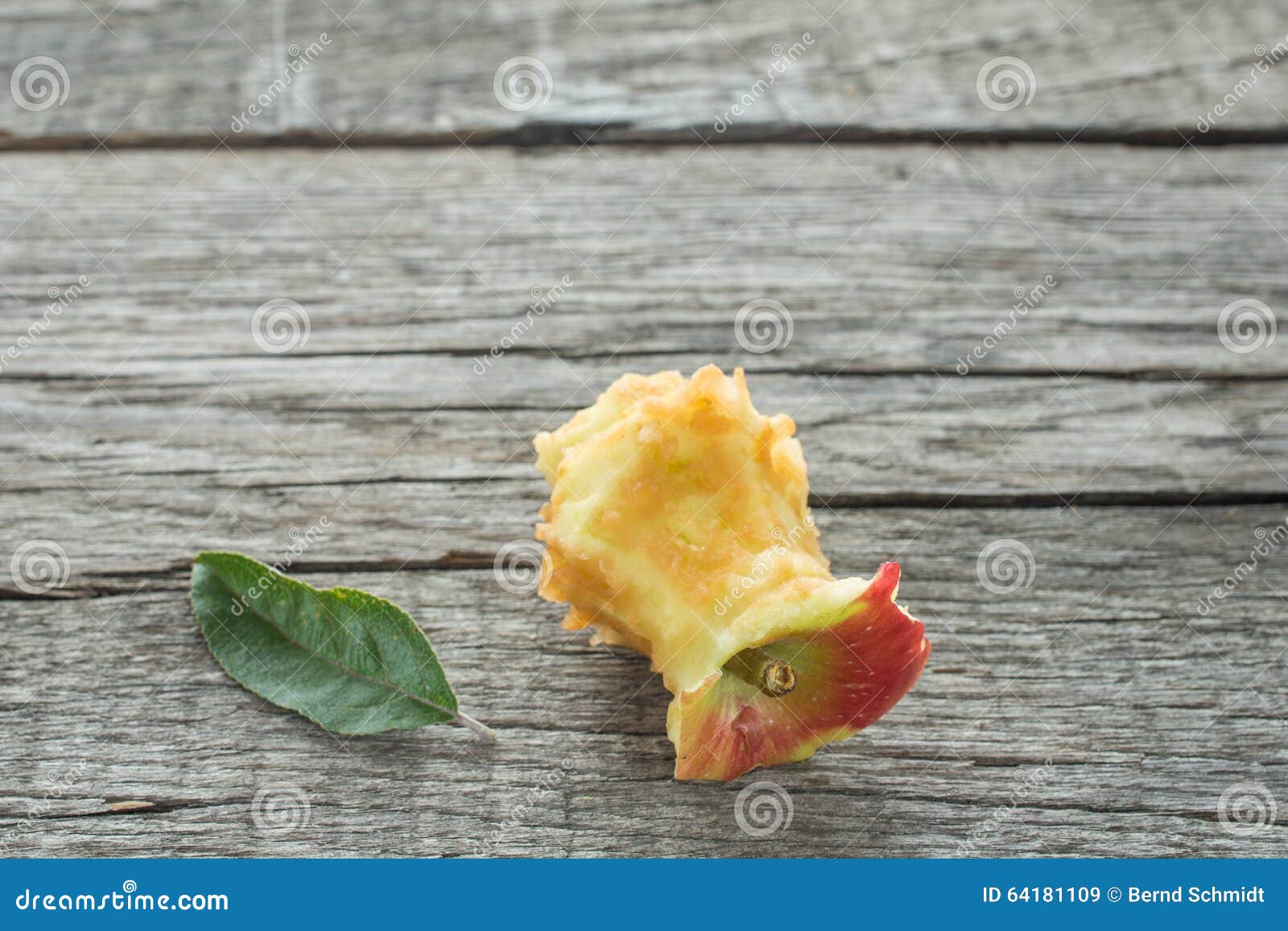 Tarnished Old Apple Core on a Wooden Board Stock Image - Image of ...