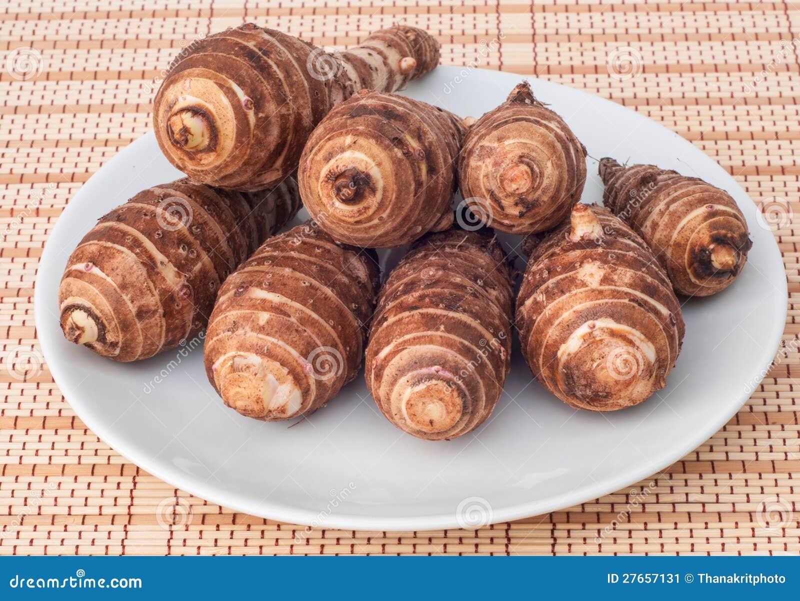 Taro on white plate stock image. Image of food, starch - 27657131