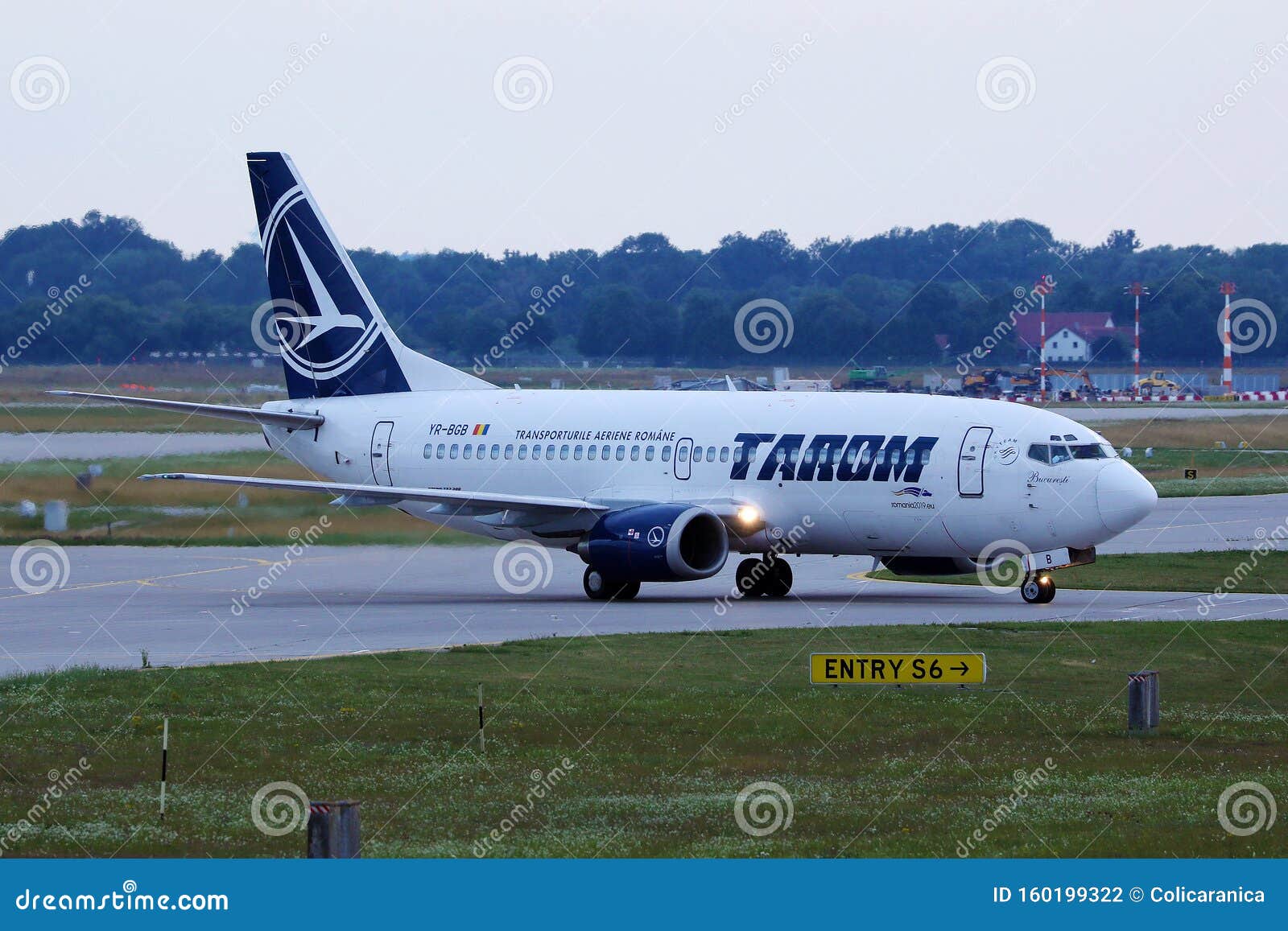 Tarom plane on the runway editorial photography. Image of runway ...