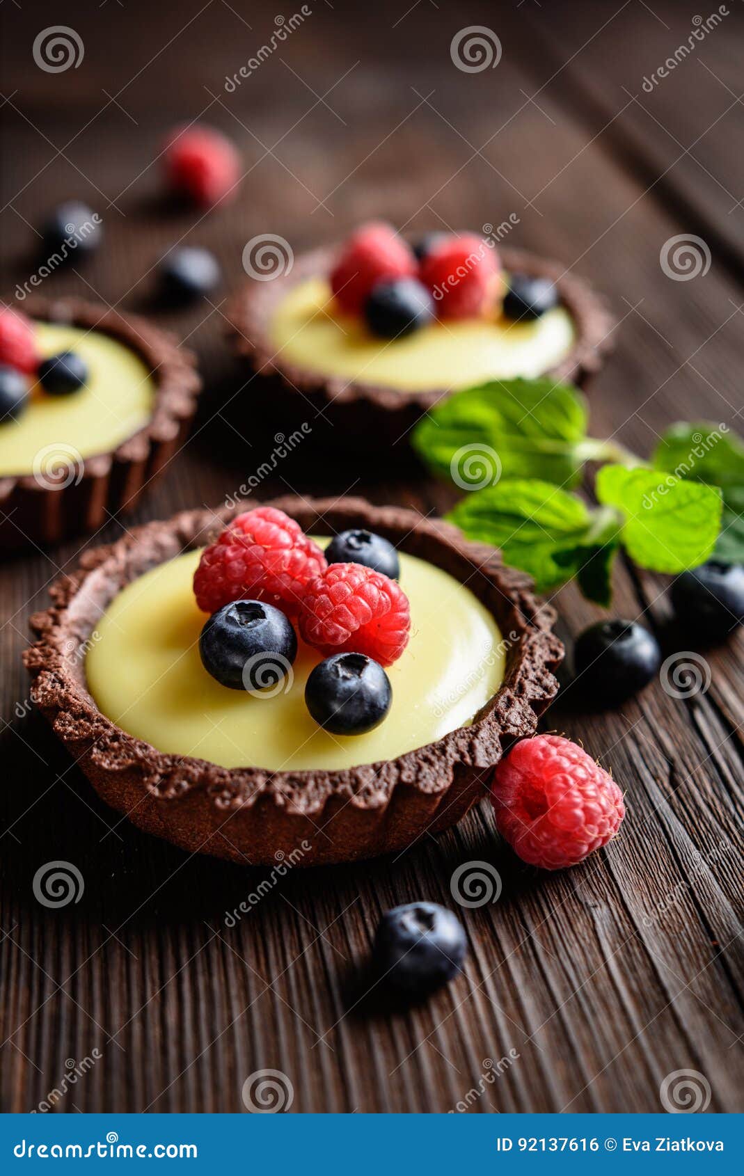 Tartlets with Vanilla Pudding, Blueberry and Raspberry Stock Photo ...