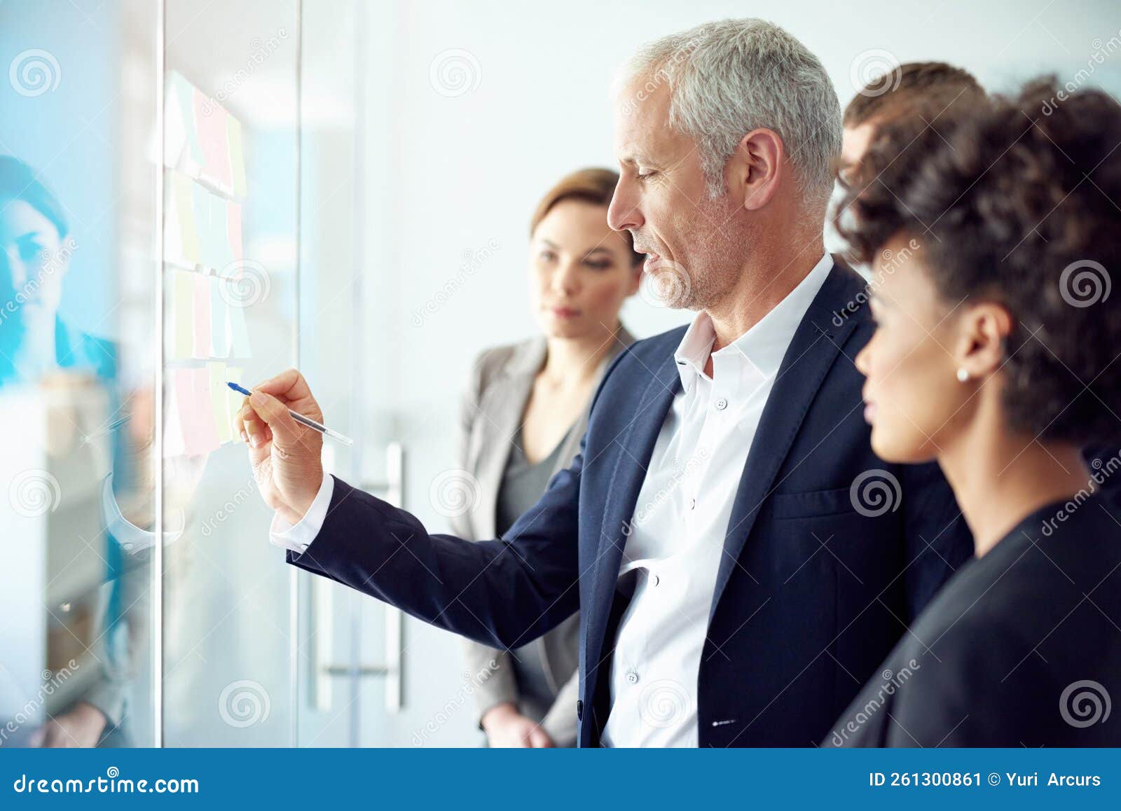 This Task is Our First Priority. a Group of Colleagues Having a ...