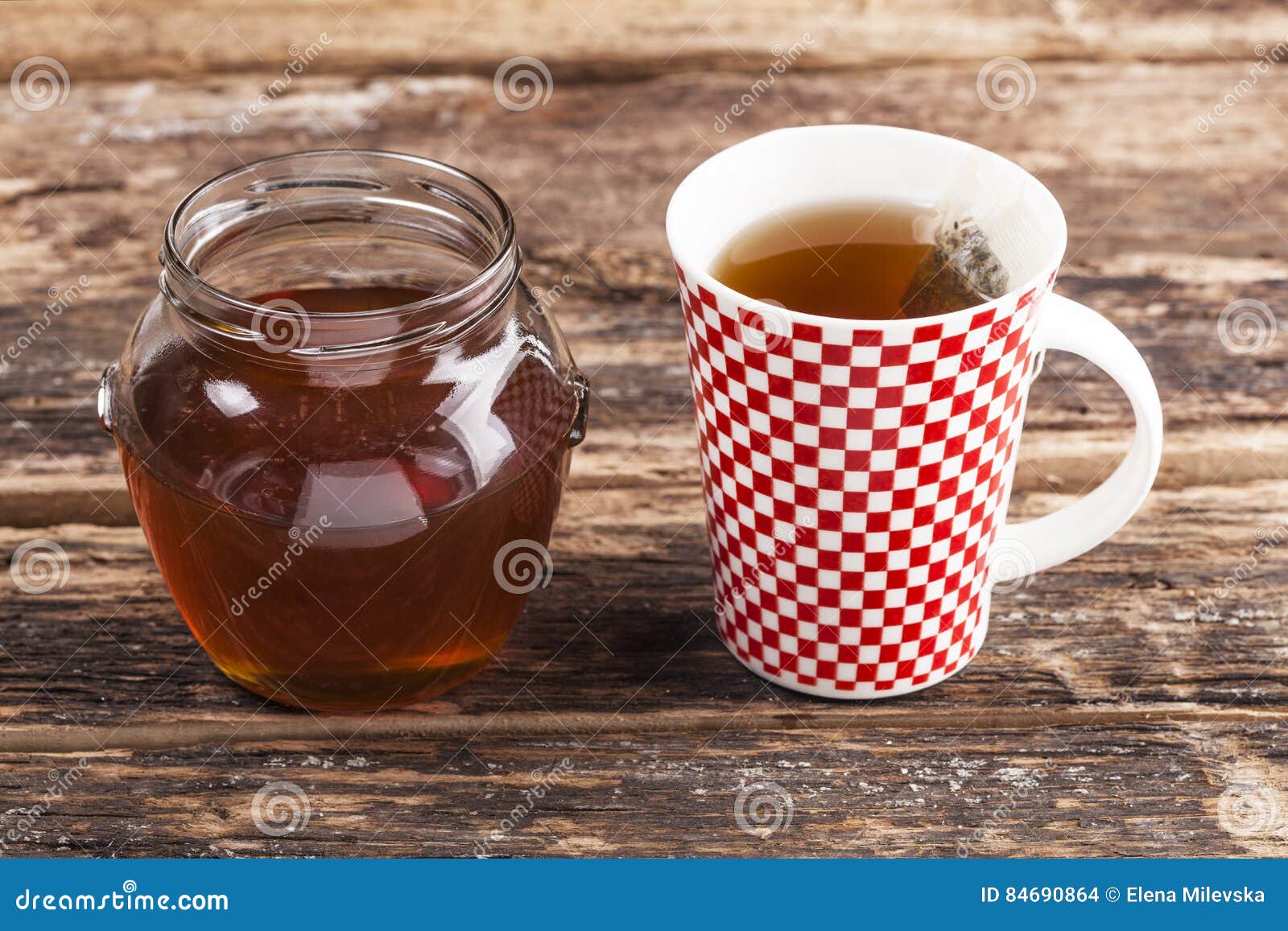 Tasse Tee mit Honig stockfoto. Bild von honig, blüte - 84690864
