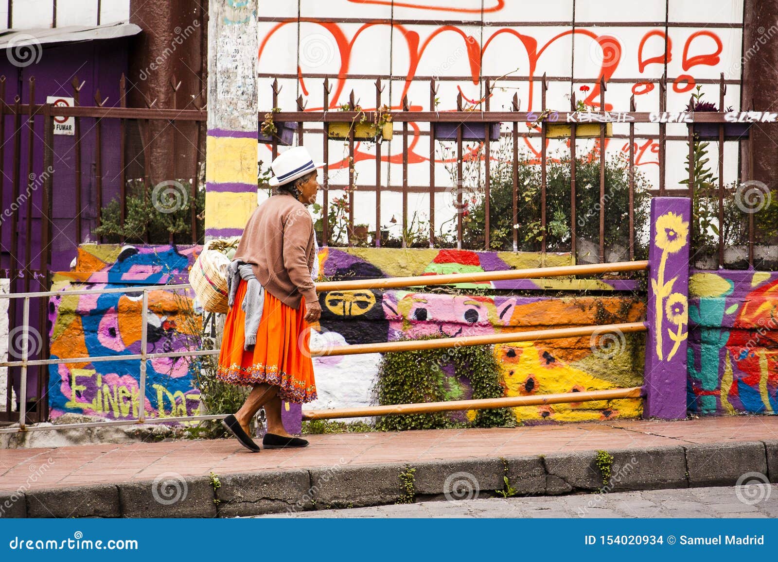 Cuenca, Ecuador. Group Of Girls Dancers Dressed In Colorful Costumes As ...