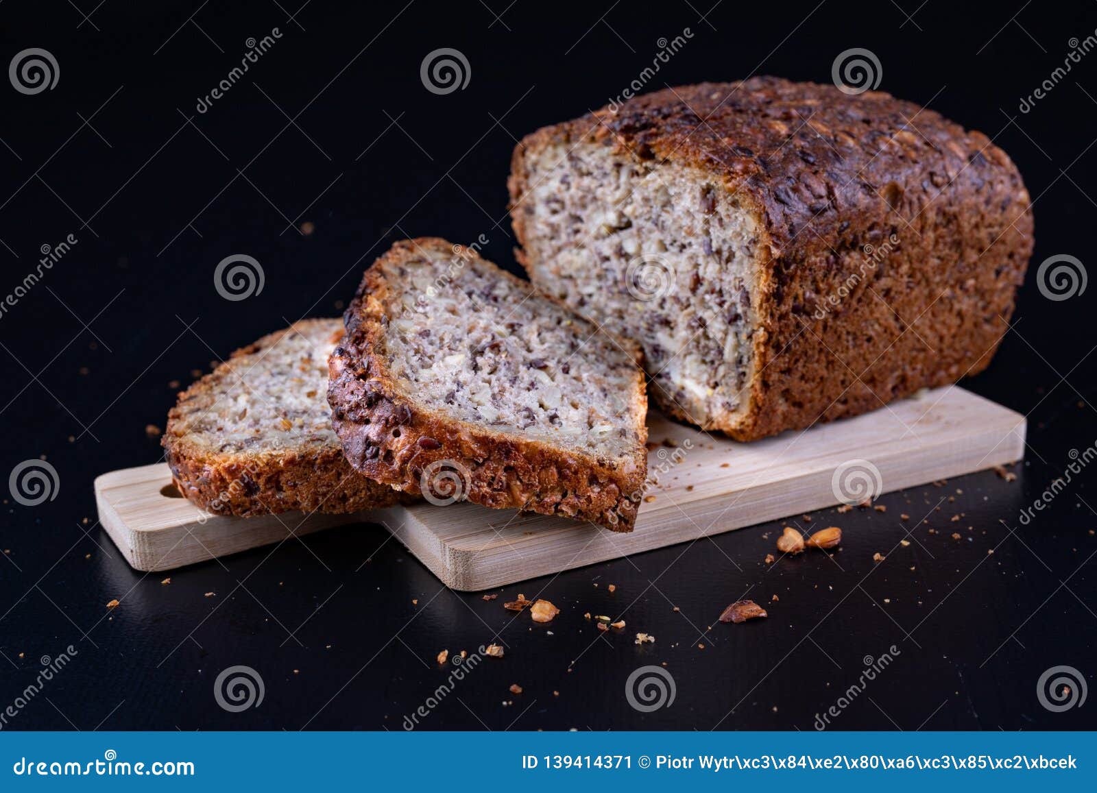 Tasting Bread with Seeds on a Wooden Board. Fresh Dark Bread on the ...