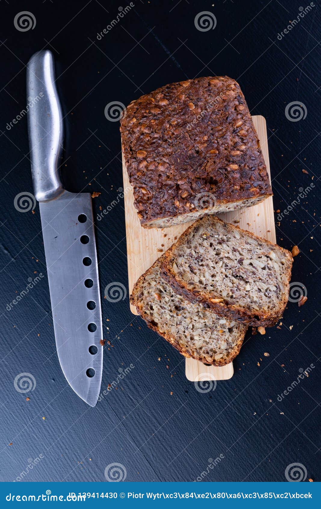 Tasting Bread with Seeds on a Wooden Board. Fresh Dark Bread on the ...