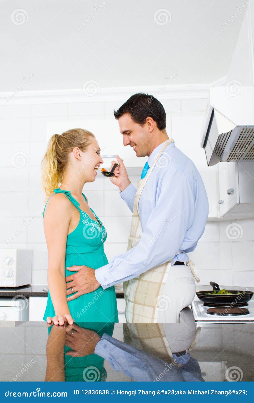 Tasting food stock photo. Image of cheerful, hugging - 12836838