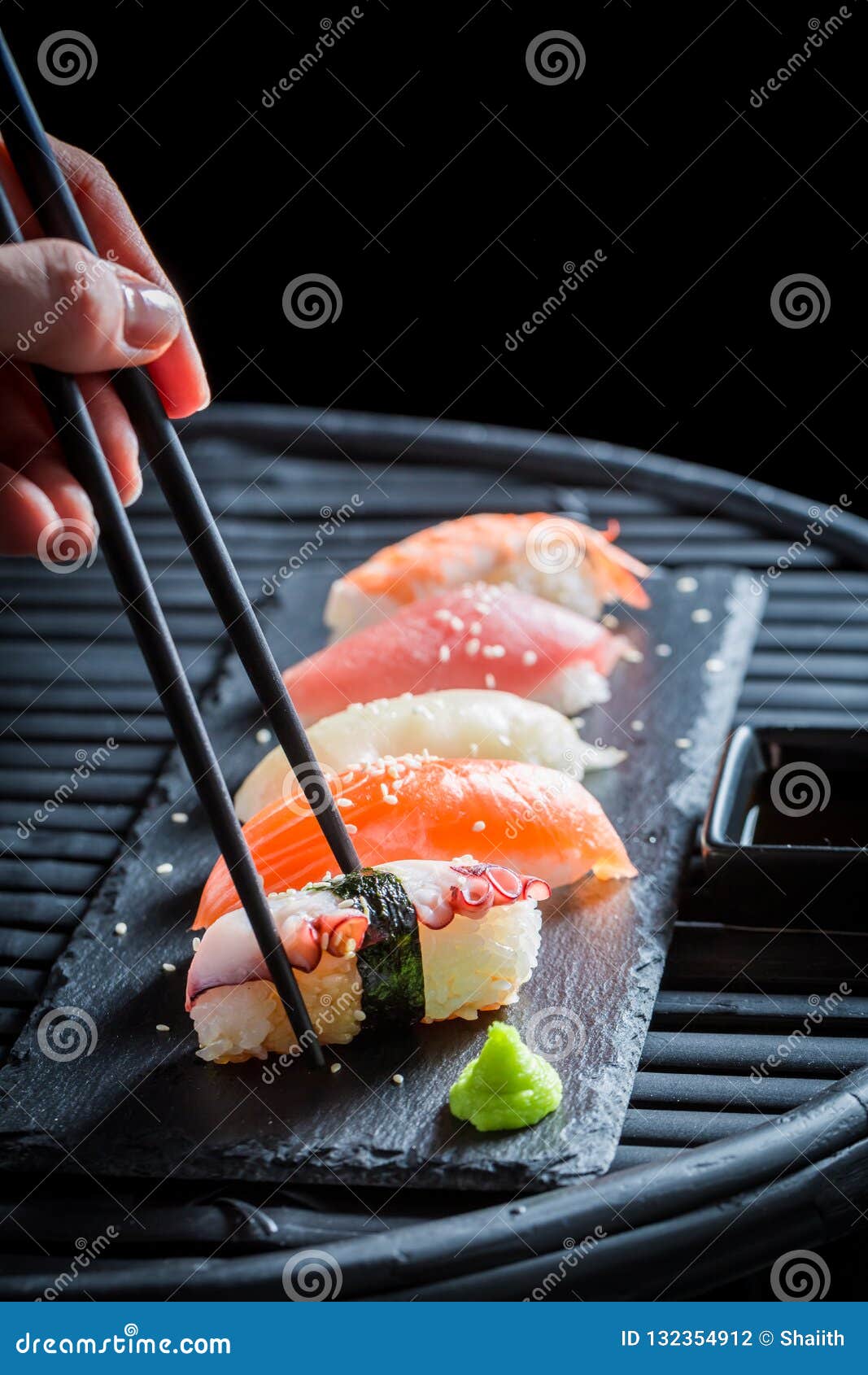 Tasting Nigiri Sushi with Rice and Shrimp on Table Stock Photo - Image ...