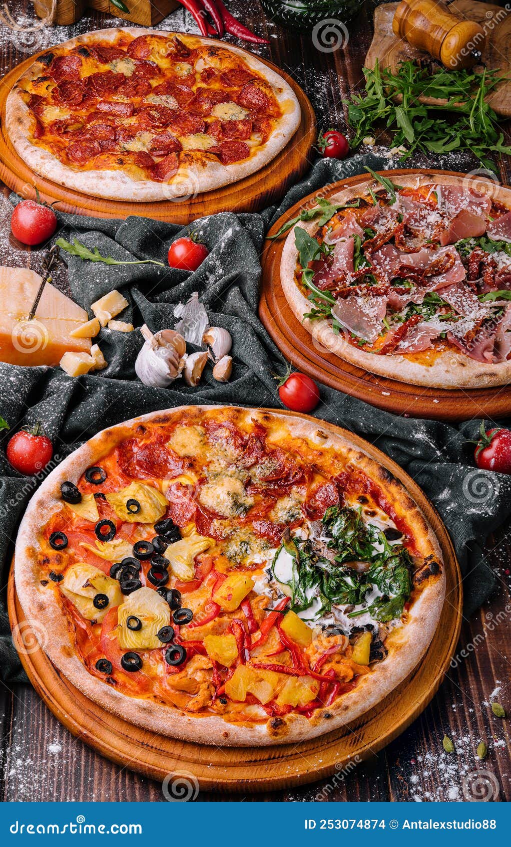 Tasty Assorted Three Pizzas on a Wooden Stock Photo - Image of meal ...
