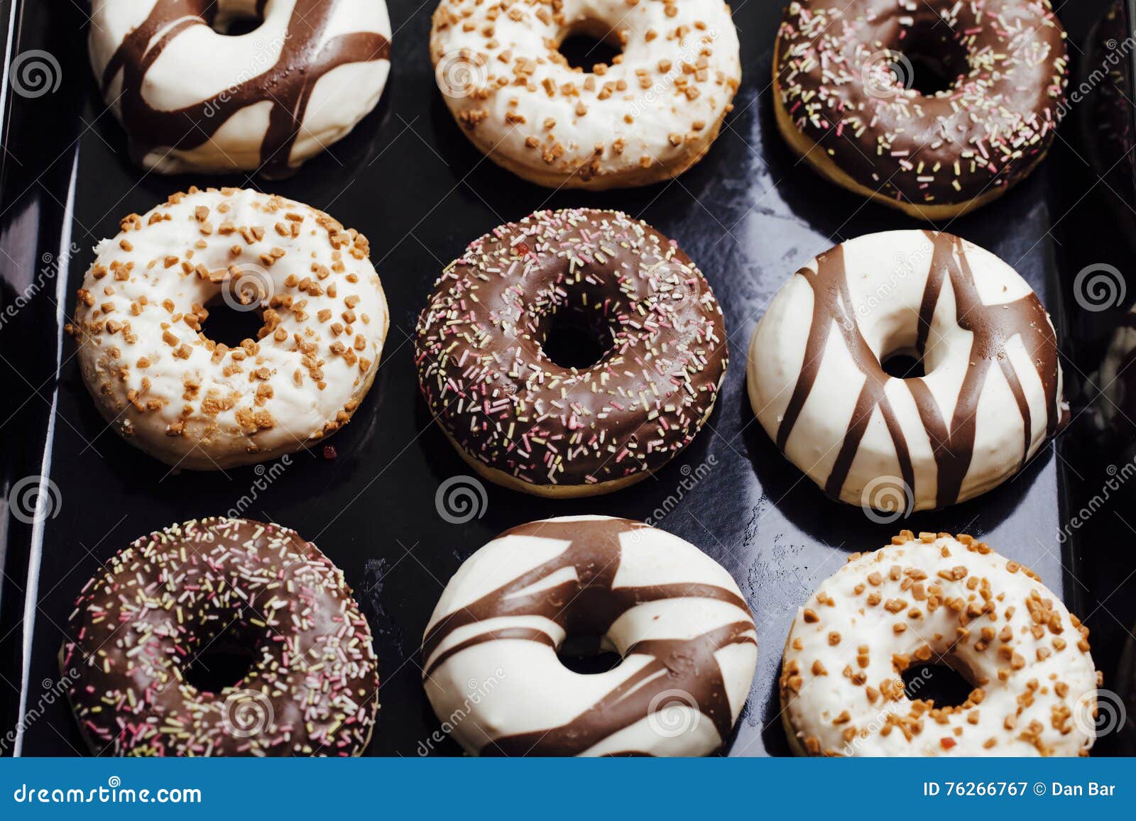 Tasty assortment of donuts stock image. Image of food - 76266767