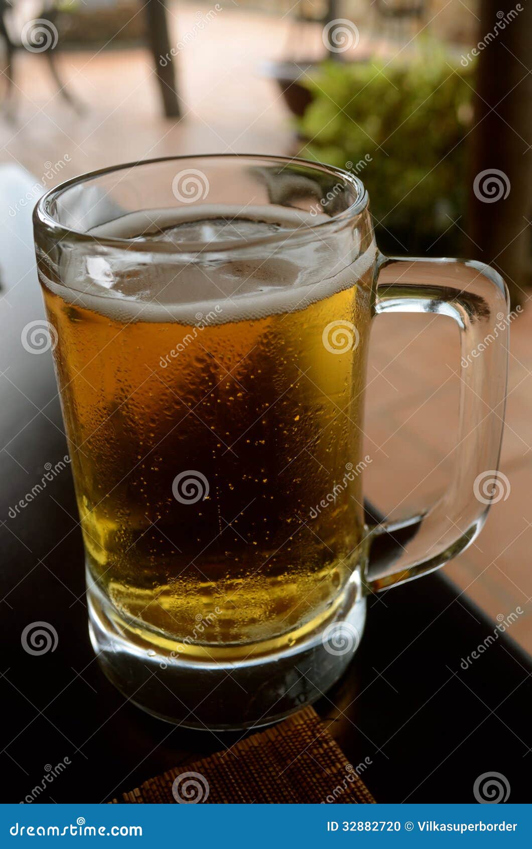 Tasty beer in a big mug stock photo. Image of beer, tasty - 32882720