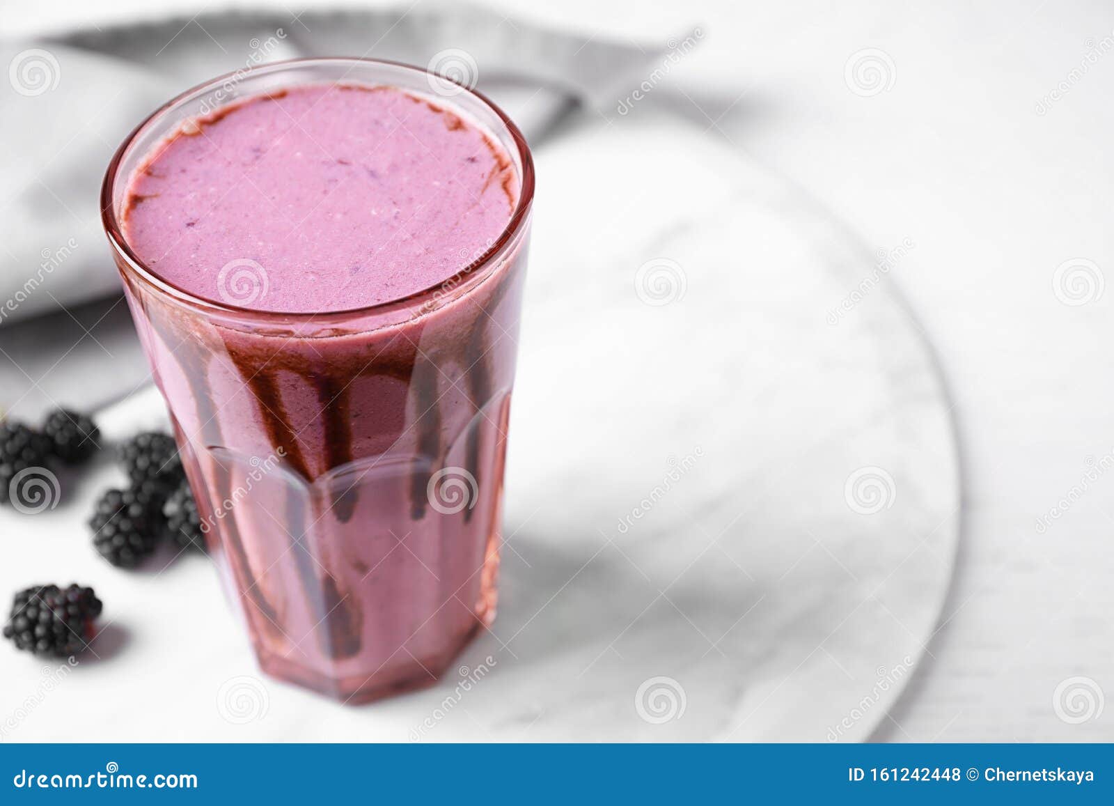 Tasty Blackberry Milk Shake in Glass on Table Stock Photo - Image of ...