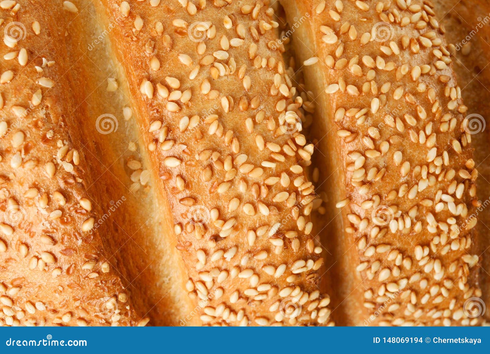 Tasty Bread with Sesame Seeds As Background Stock Photo - Image of ...