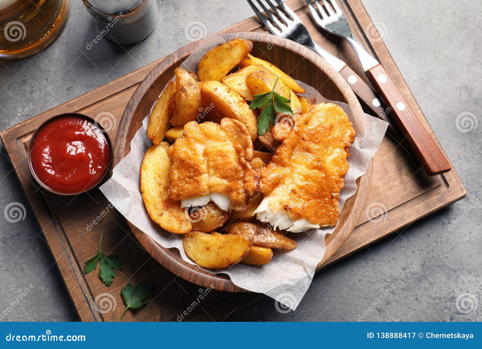 Tasty British Traditional Fish and Potato Chips on Table Stock Image ...