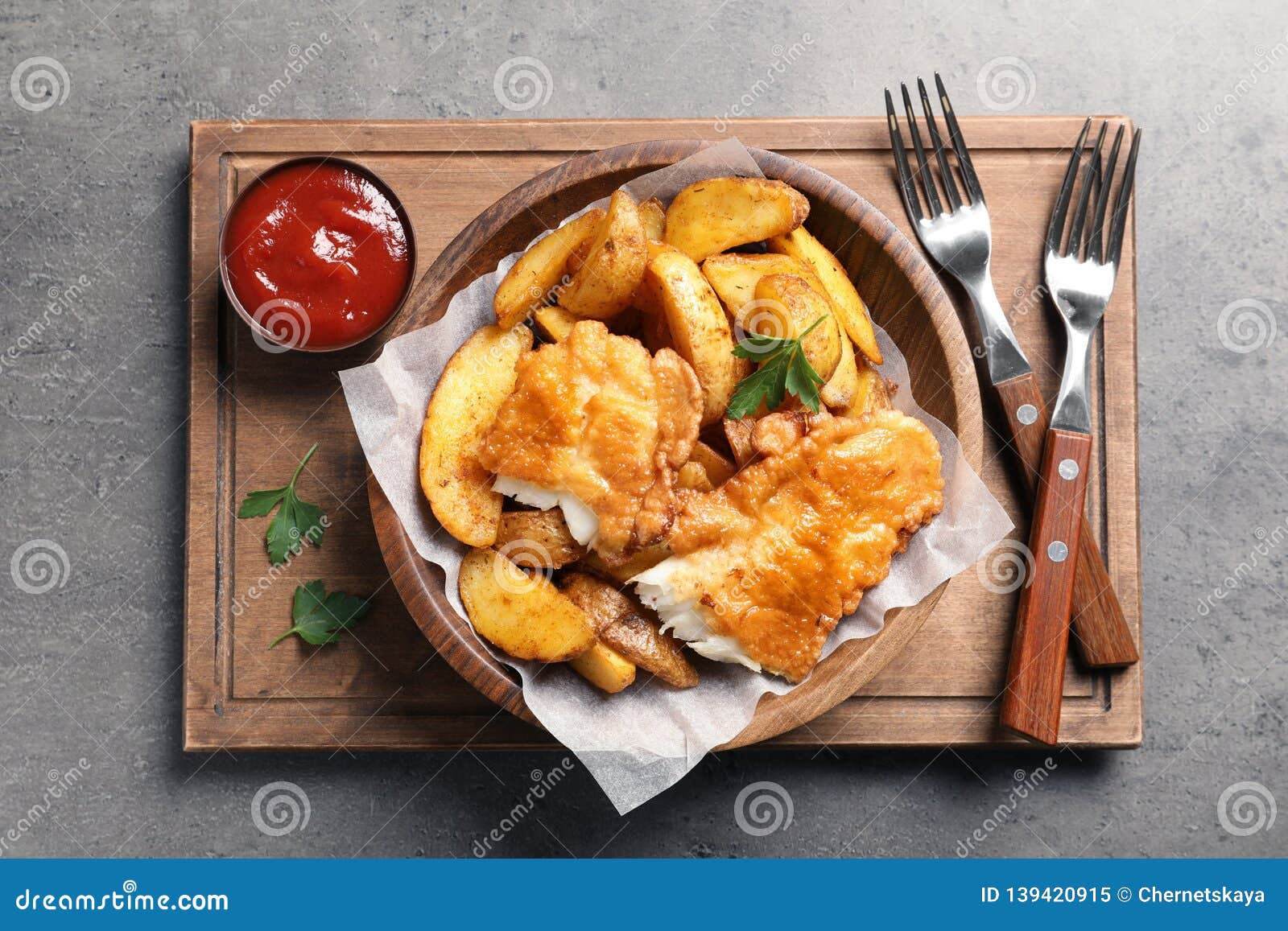Tasty British Traditional Fish and Potato Chips on Table Stock Image ...