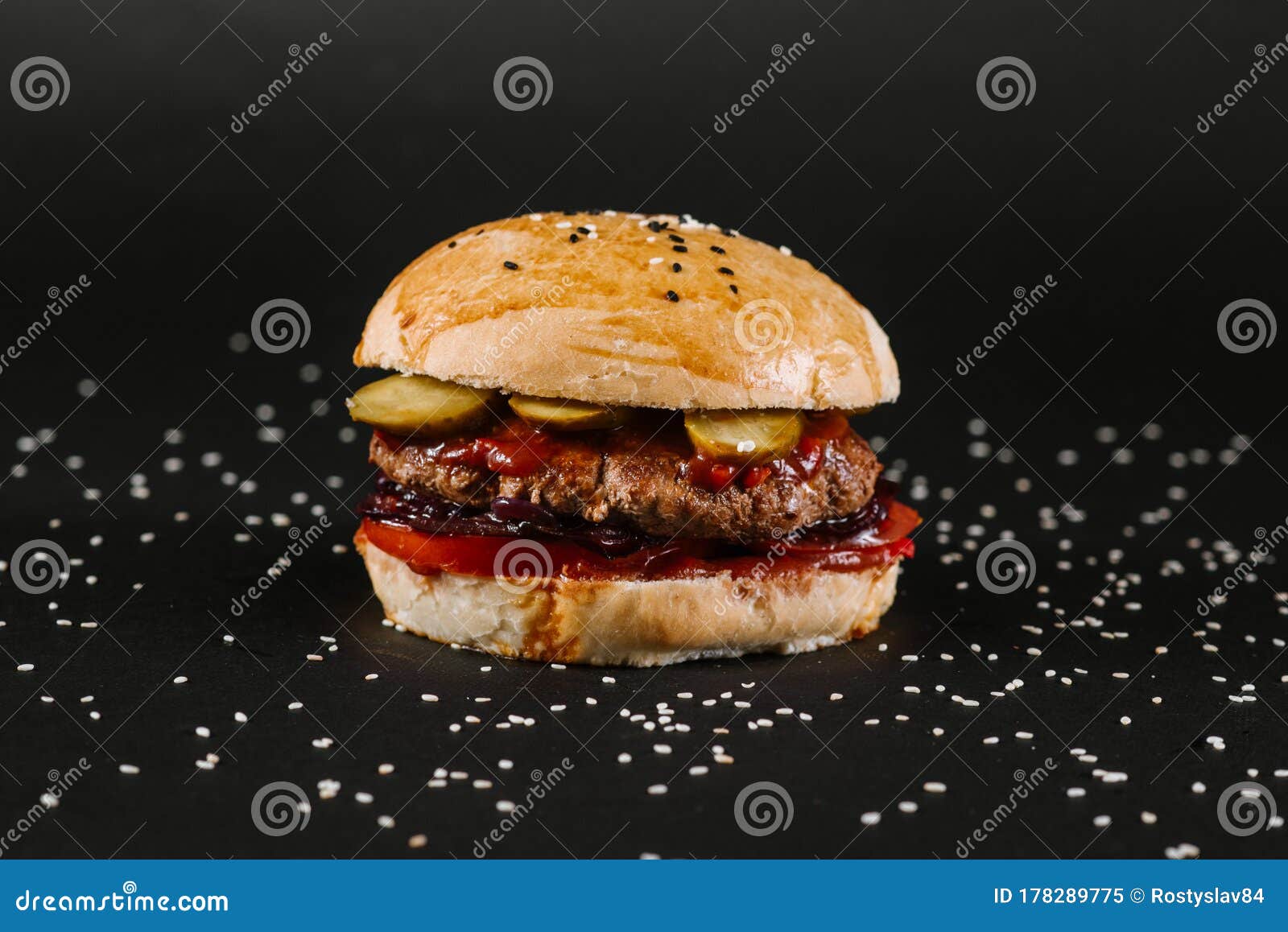 Tasty Burger on the Black Background Stock Image - Image of sesame ...