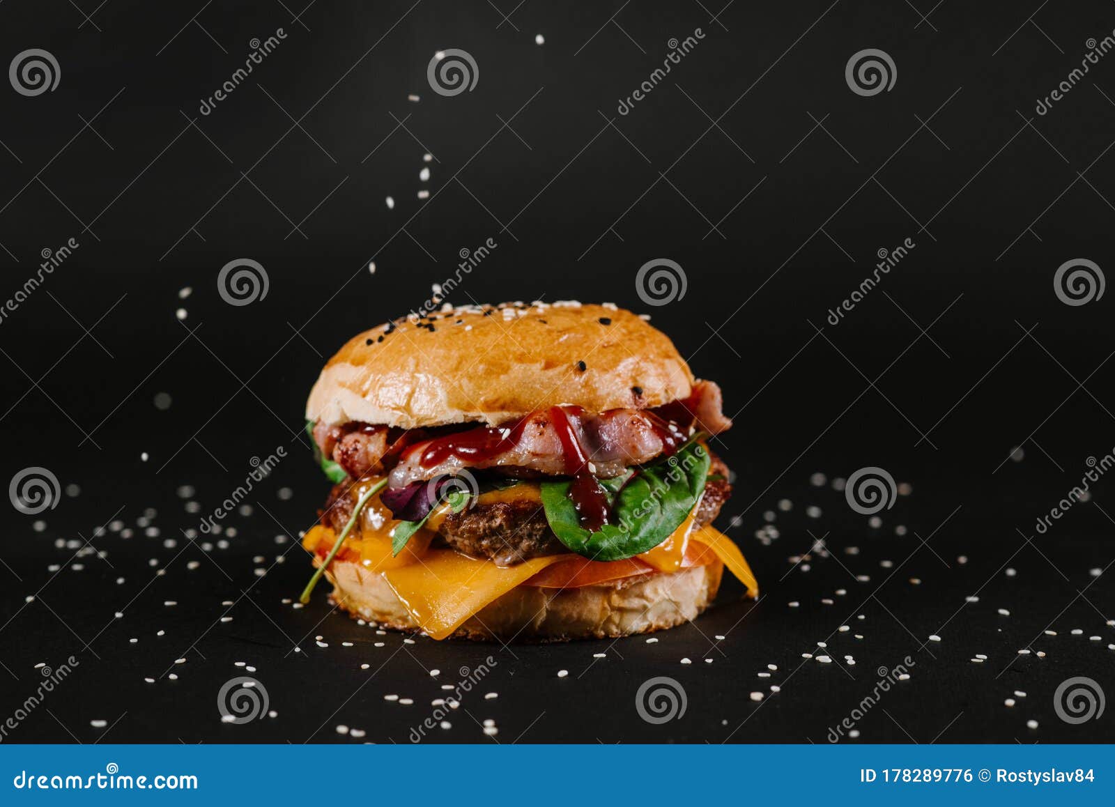 Tasty Burger on the Black Background Stock Photo - Image of meat ...