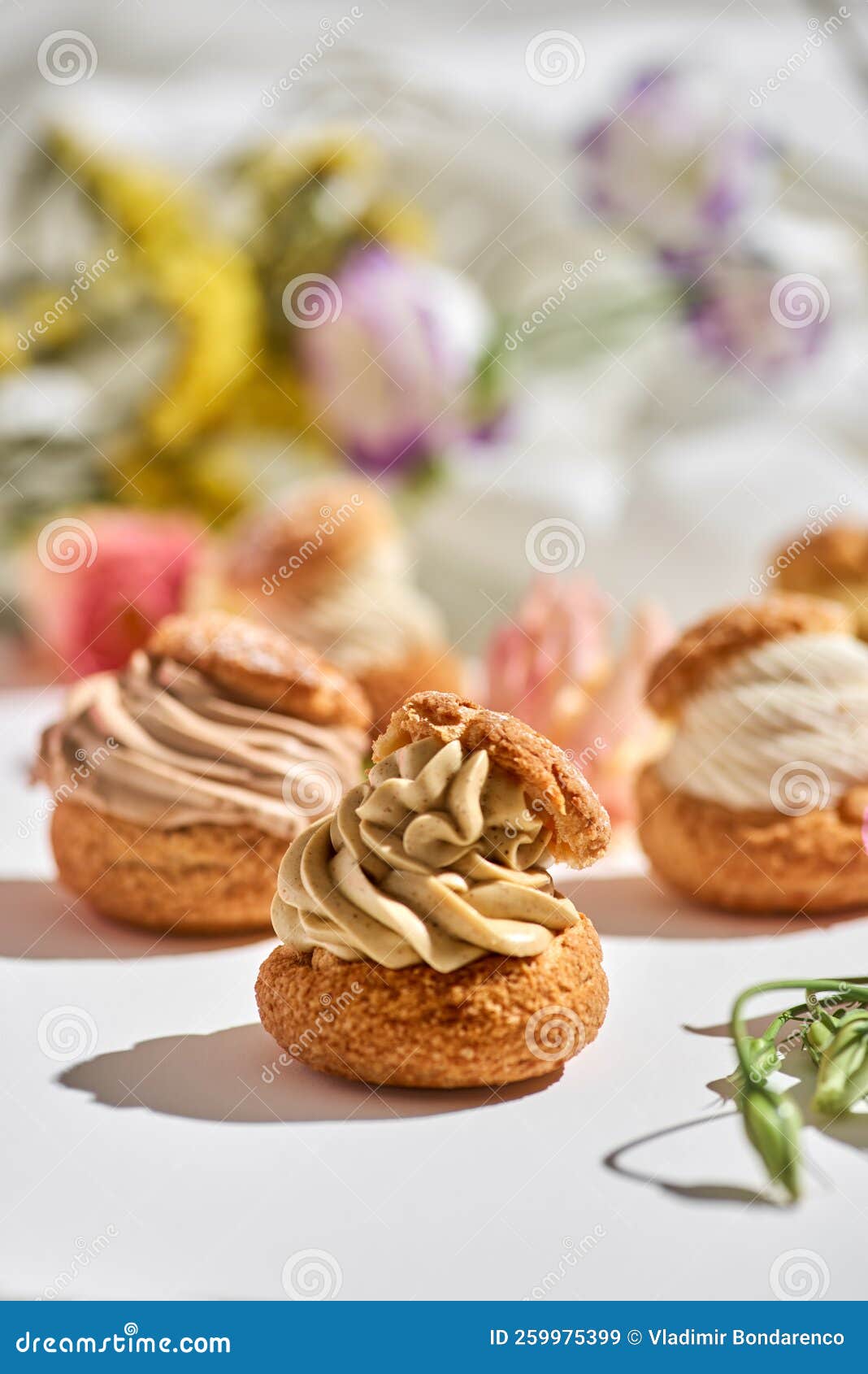 Tasty Cake Shu or Eclairs with Cream on White Background with Copy ...