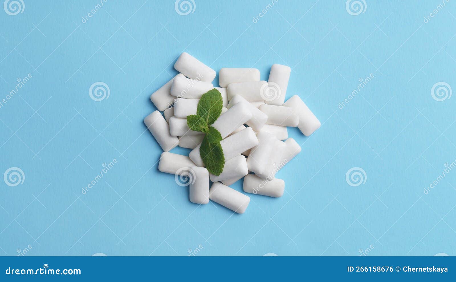 Tasty Chewing Gums and Mint Leaves on Light Blue Background, Flat Lay ...
