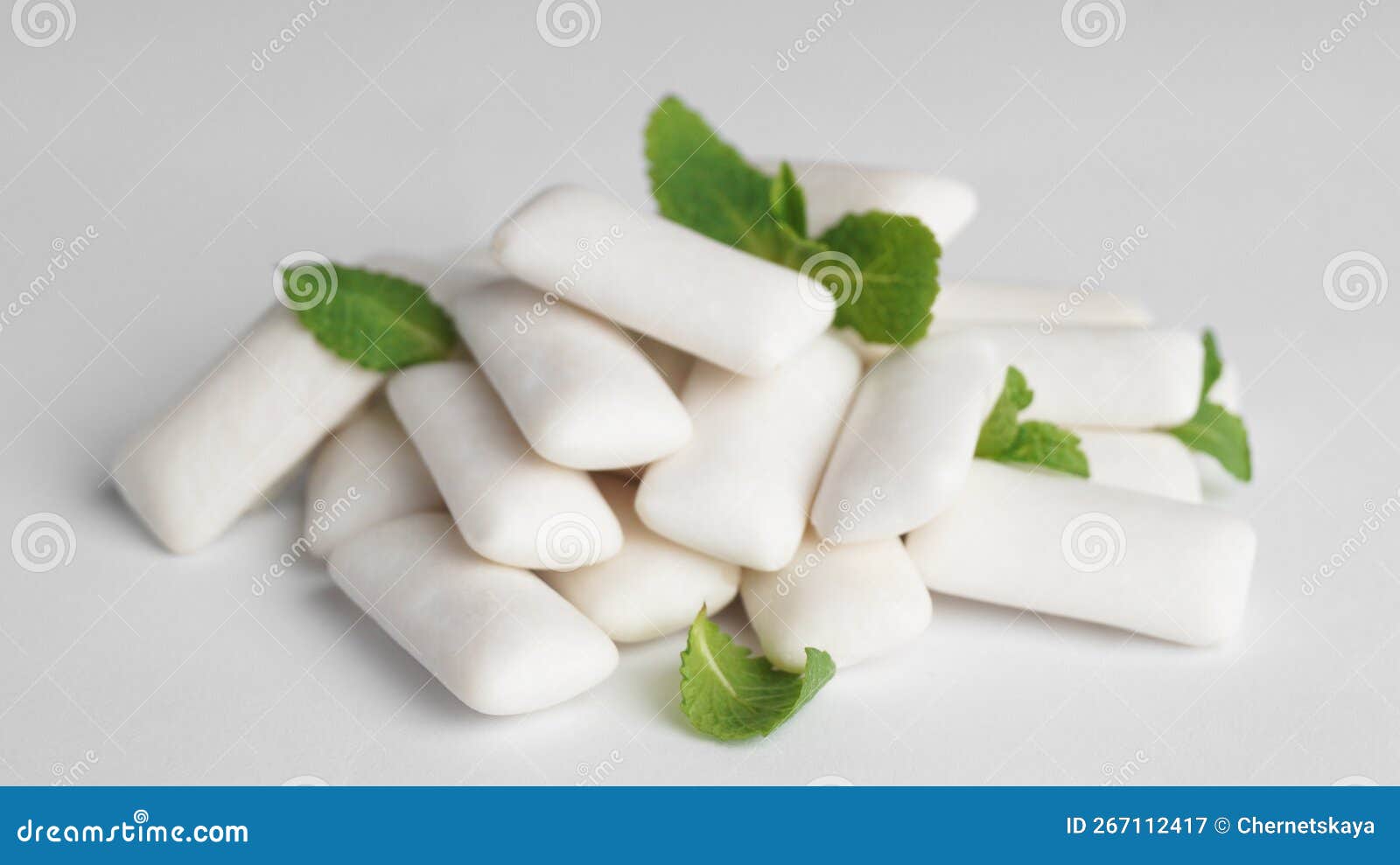Tasty Chewing Gums and Mint Leaves on White Background Stock Image ...