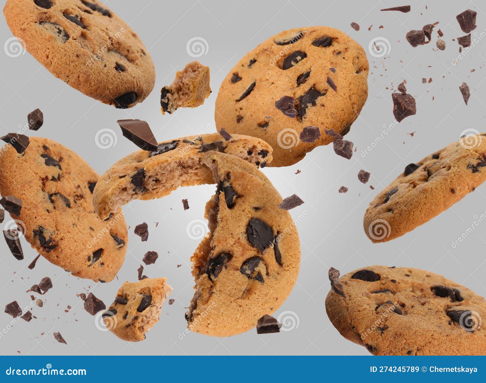 Tasty Chocolate Chip Cookies Falling on Light Grey Background Stock ...