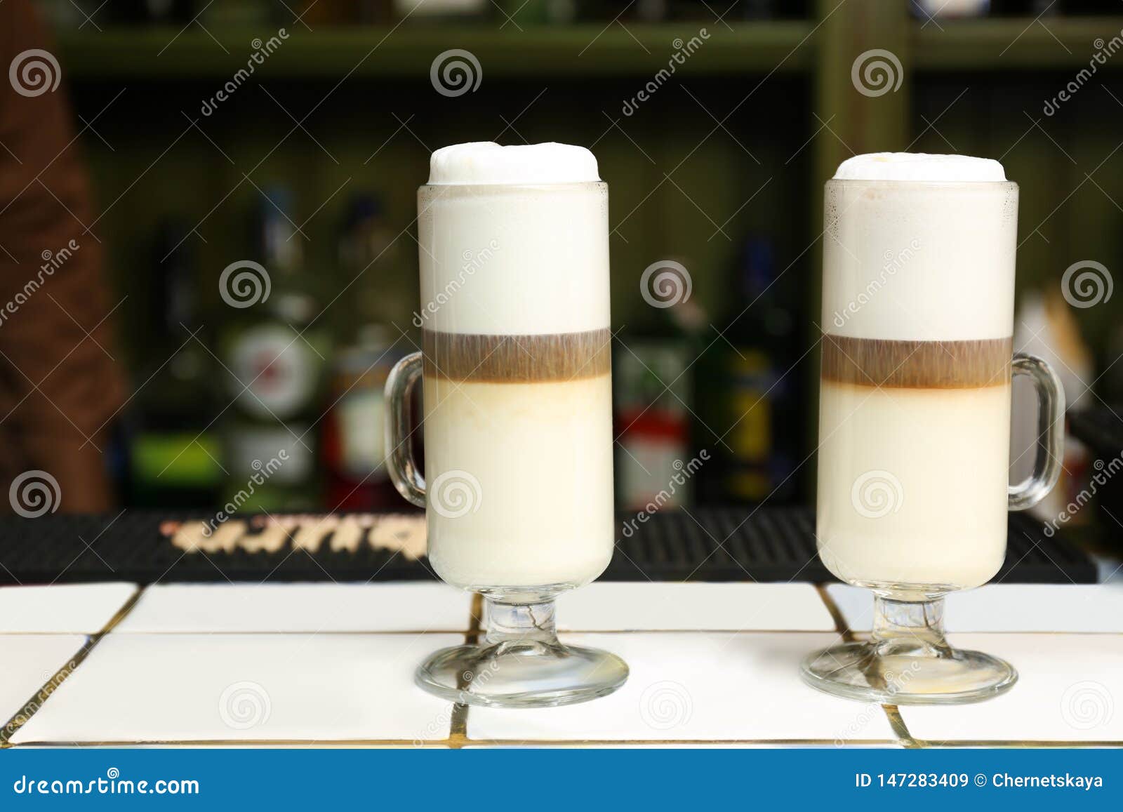 Tasty Coffee Drinks on Table Stock Image - Image of milk, glass: 147283409