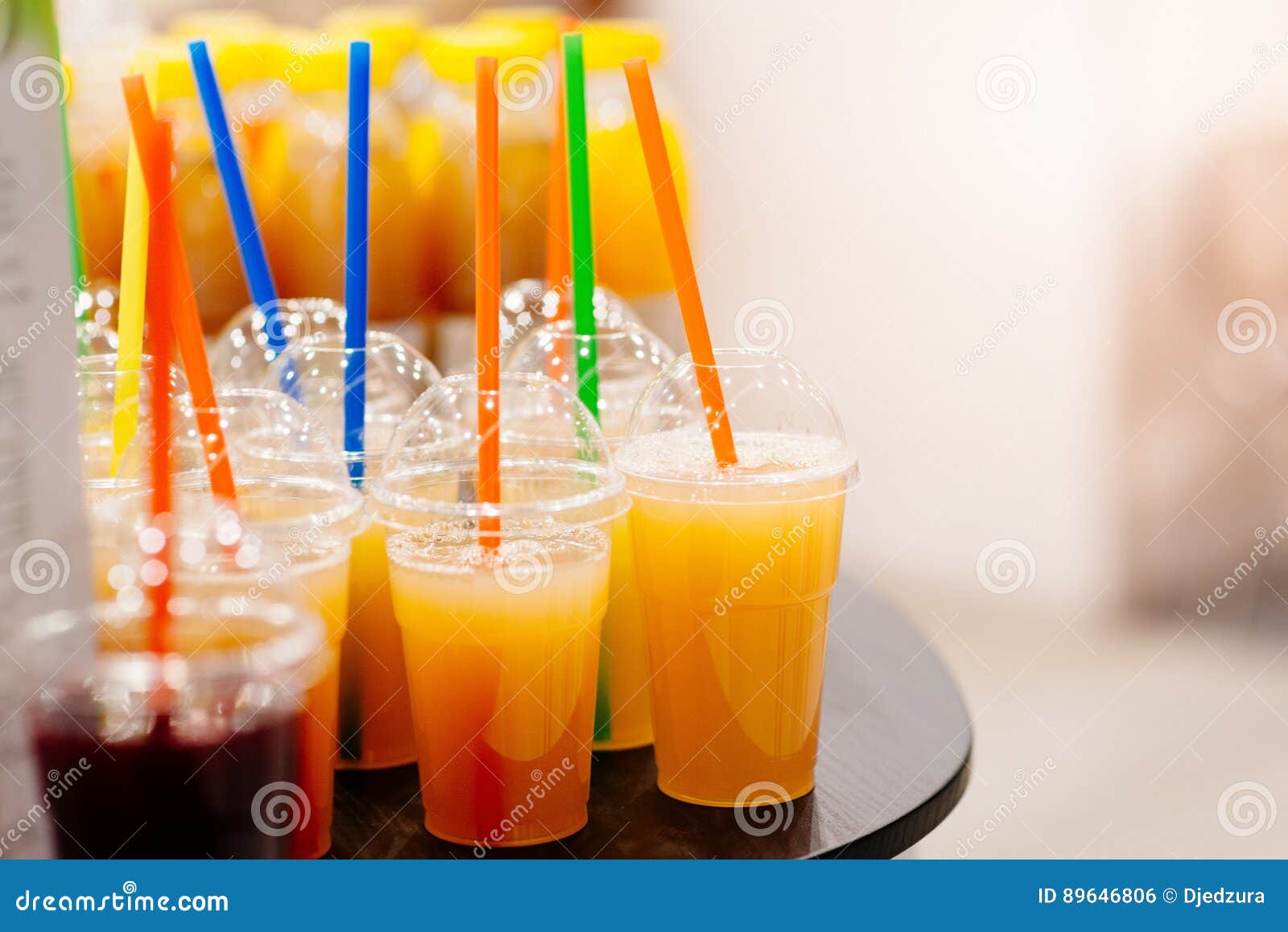 Tasty Cold Orange Juice in Plastic Cup Stock Photo - Image of tropical ...