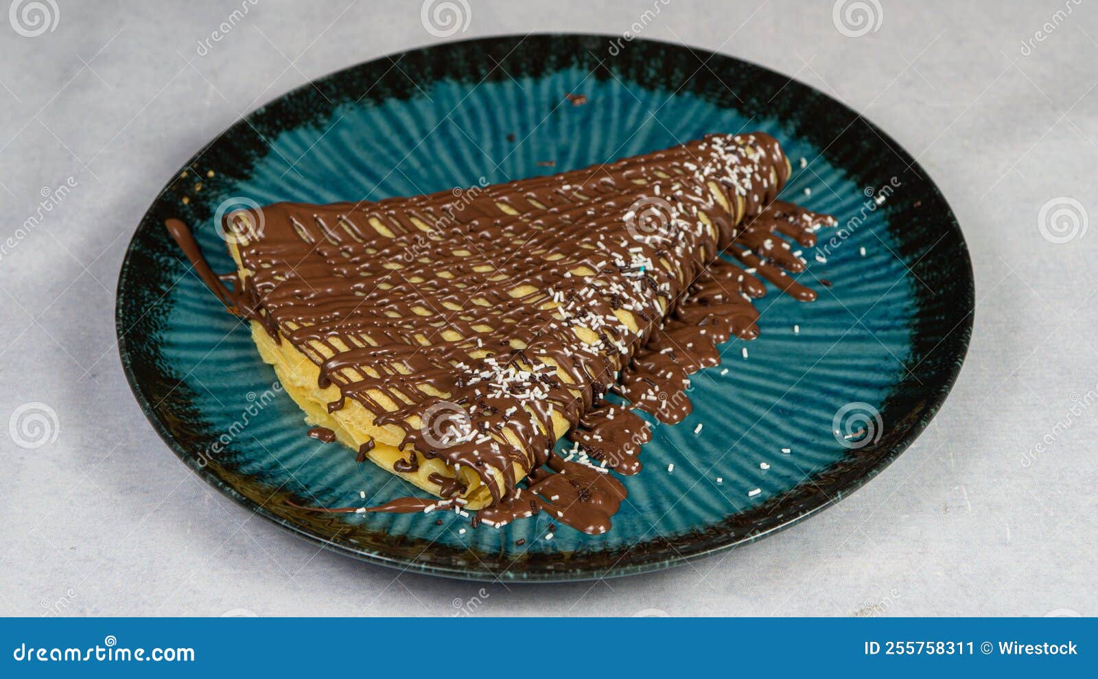 Tasty Crepe Drizzled with Chocolate on a Plate Stock Image - Image of ...