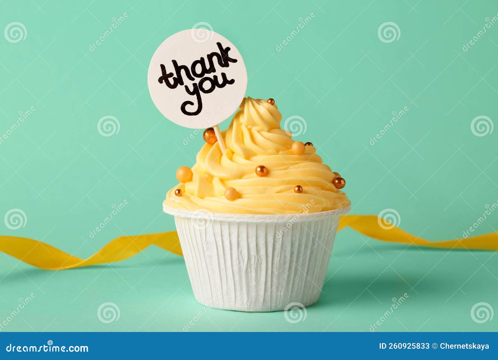 Tasty Cupcake and Note with Phrase Thank You on Turquoise Background ...