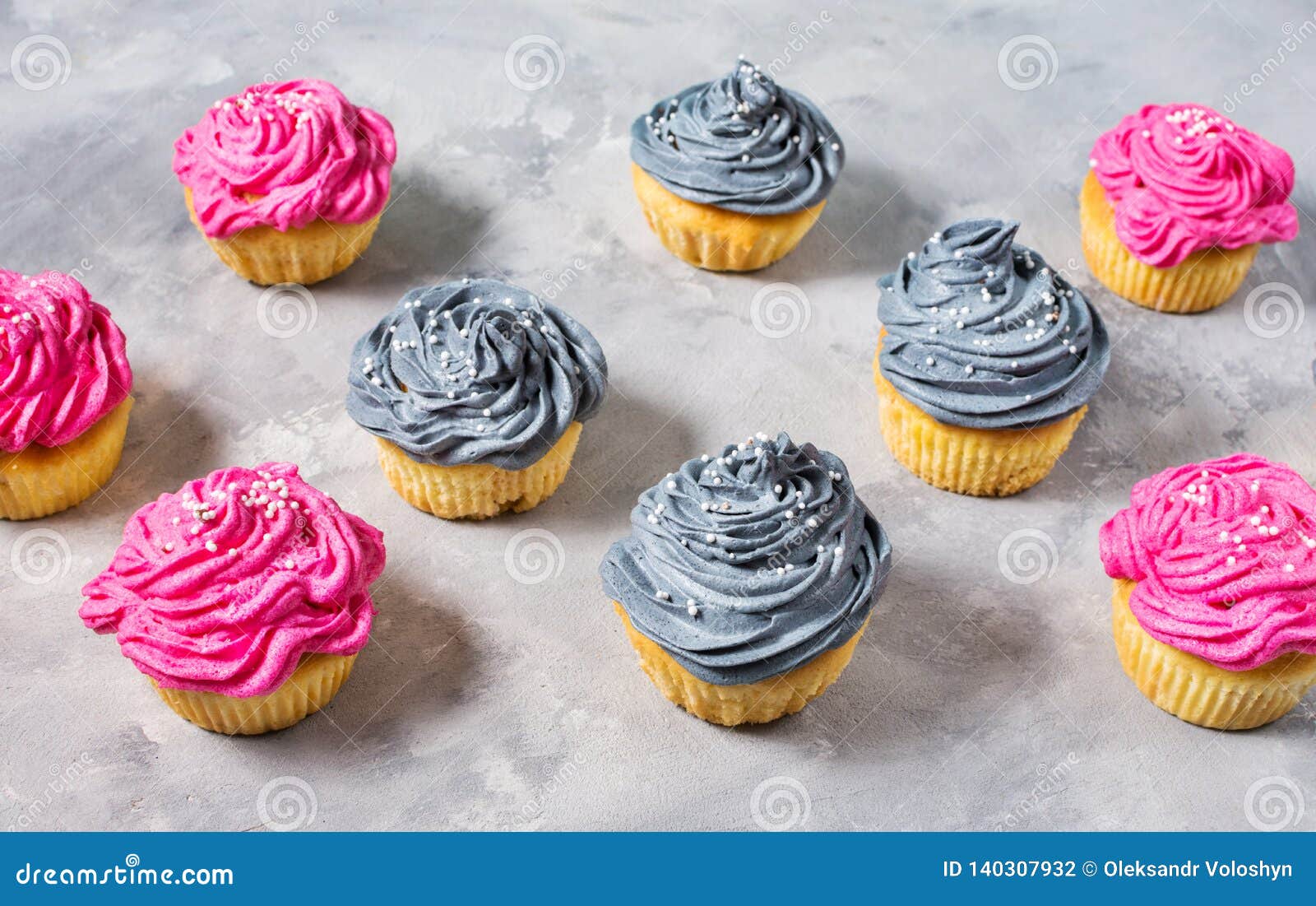 Tasty Cupcakes in a Row on Concrete Background Stock Photo - Image of ...