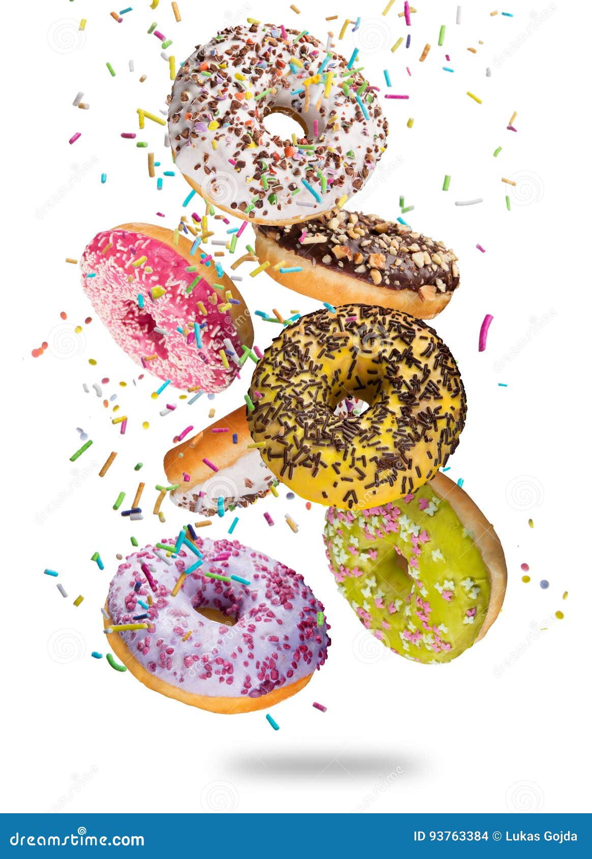 Tasty Doughnuts in Motion Falling on White Background. Stock Photo ...