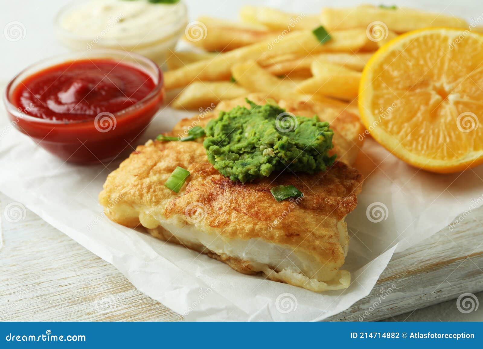 Tasty Fried Fish and Chips on White Board, Close Up Stock Photo - Image ...