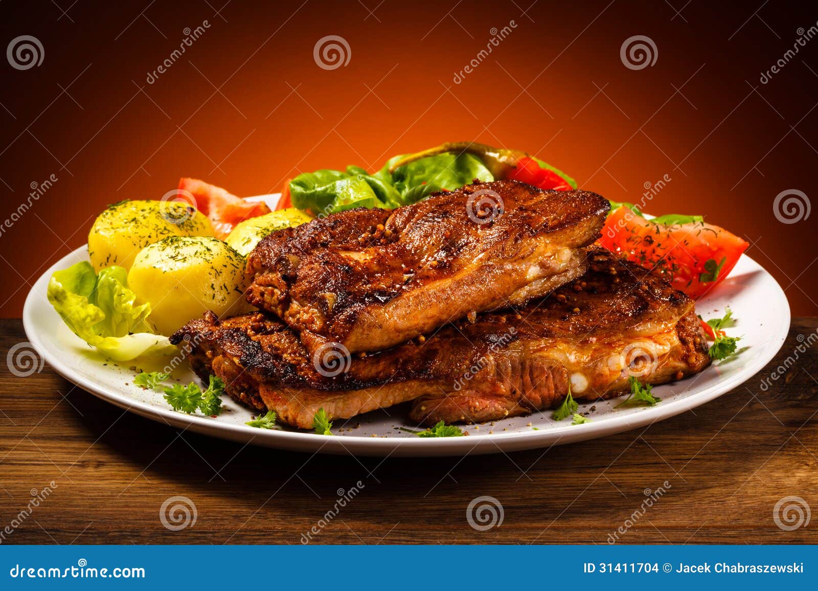 Tasty grilled ribs stock photo. Image of basil, garnish - 31411704