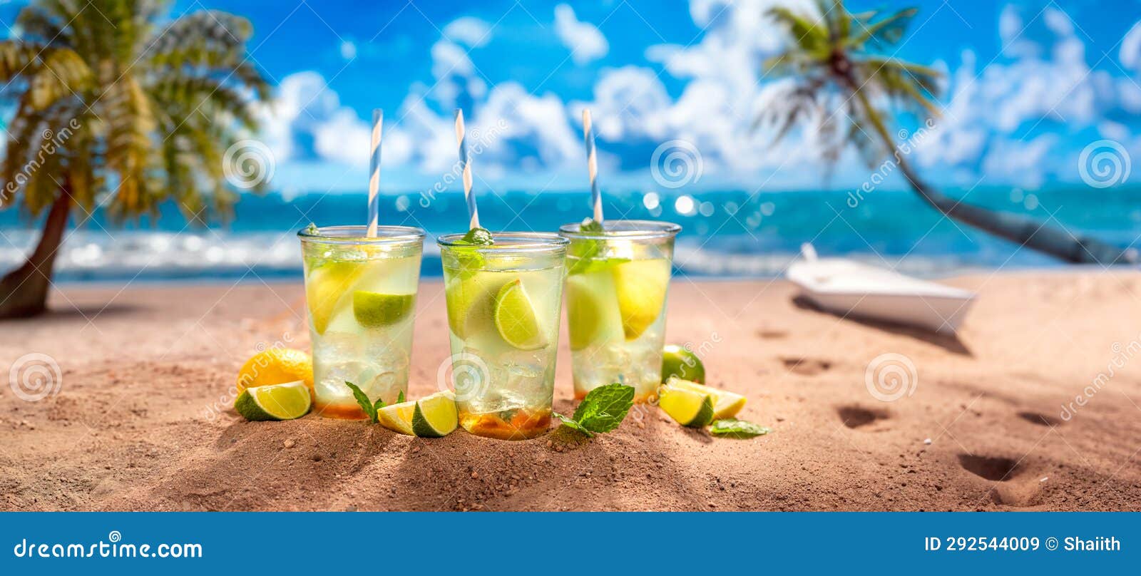 Tasty Lemonade with Ice on Sandy Beach Stock Image - Image of palm ...