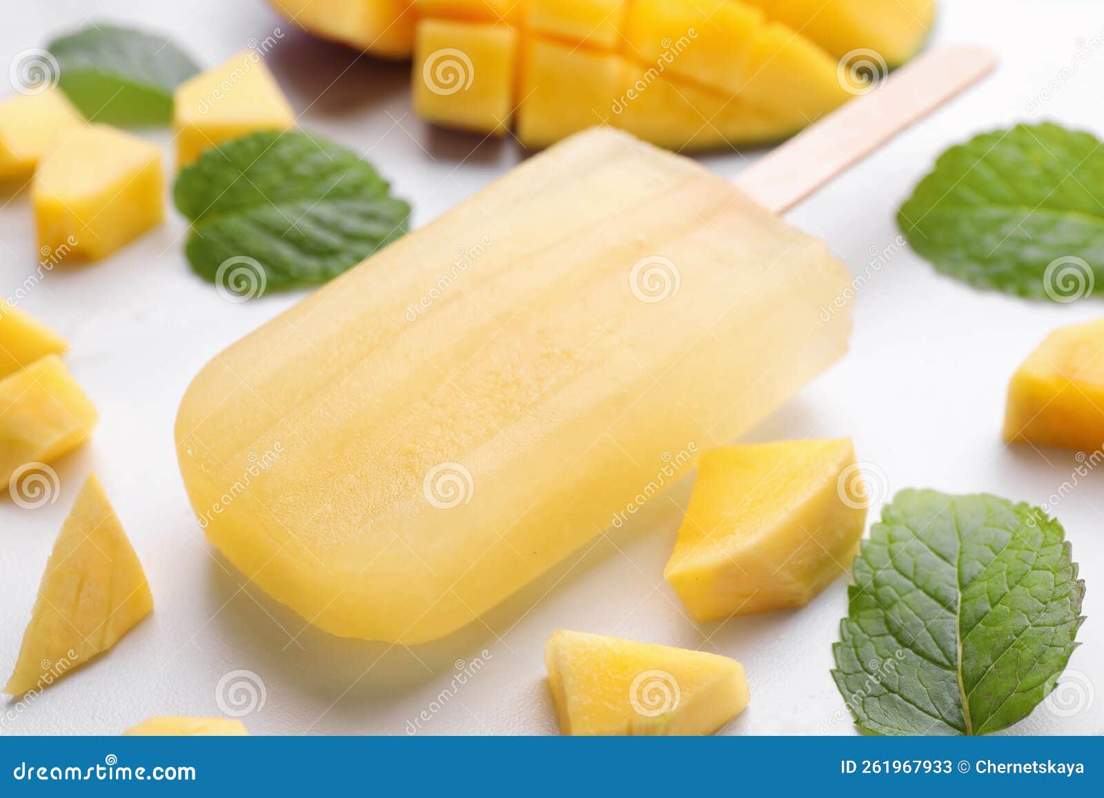 Tasty Mango Ice Pop on White Table, Closeup. Fruit Popsicle Stock Image ...