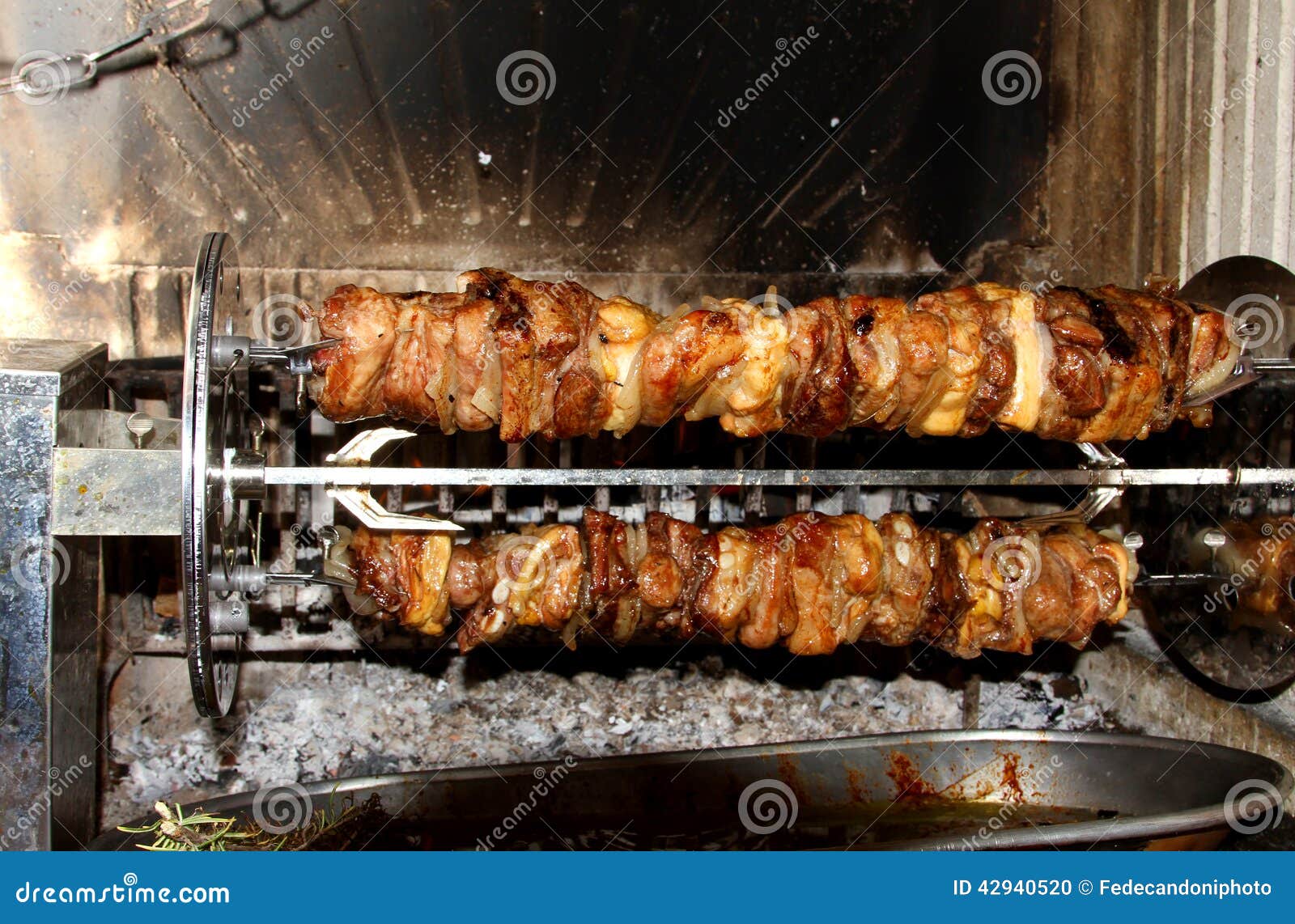 Tasty Meat Cooked in the Fireplace with the Spit 2 Stock Photo - Image ...