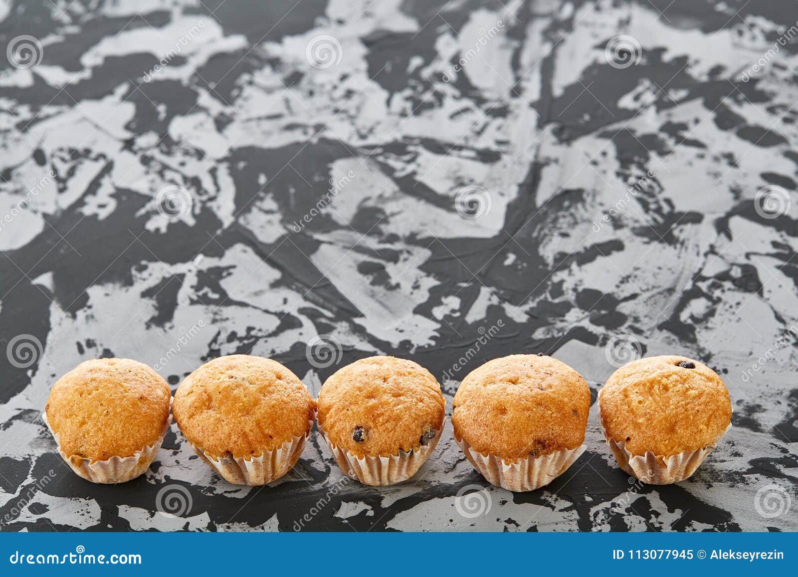 Tasty Muffins Arranged in Pattern on Light Textured Background, Close ...