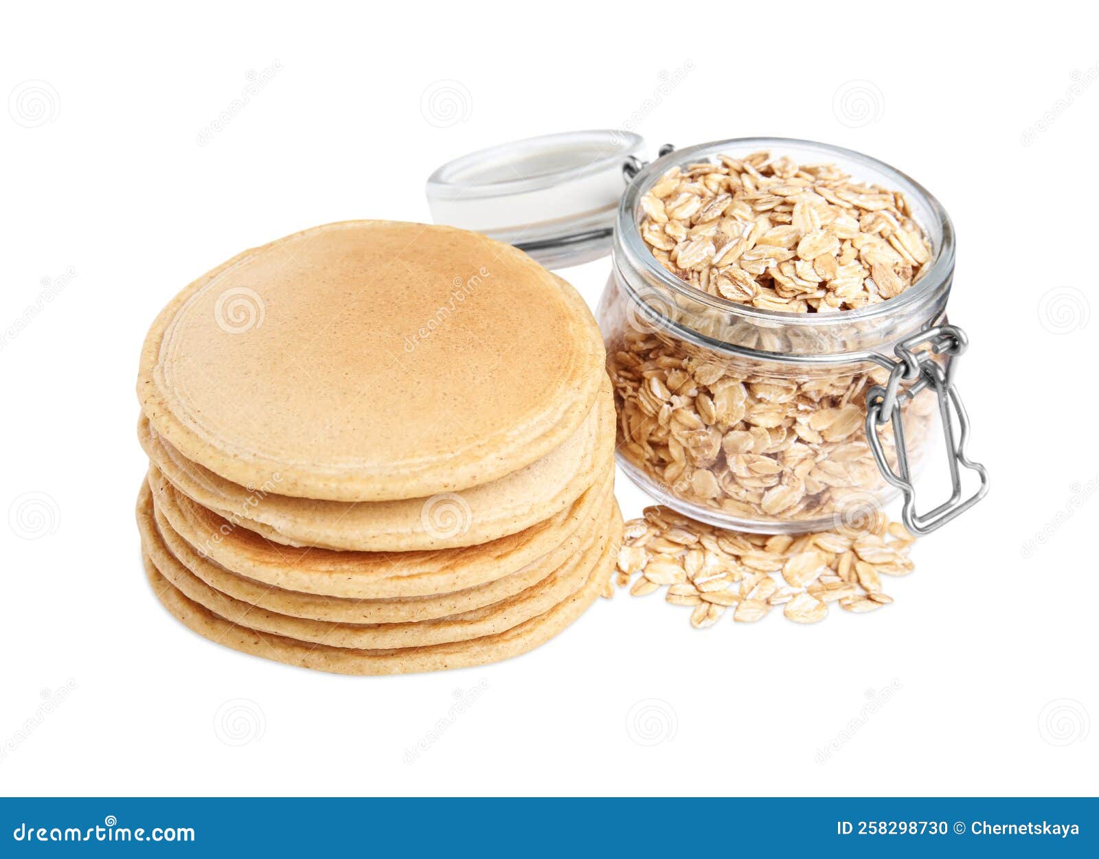 Tasty Oatmeal Pancakes and Flakes on White Background Stock Photo ...