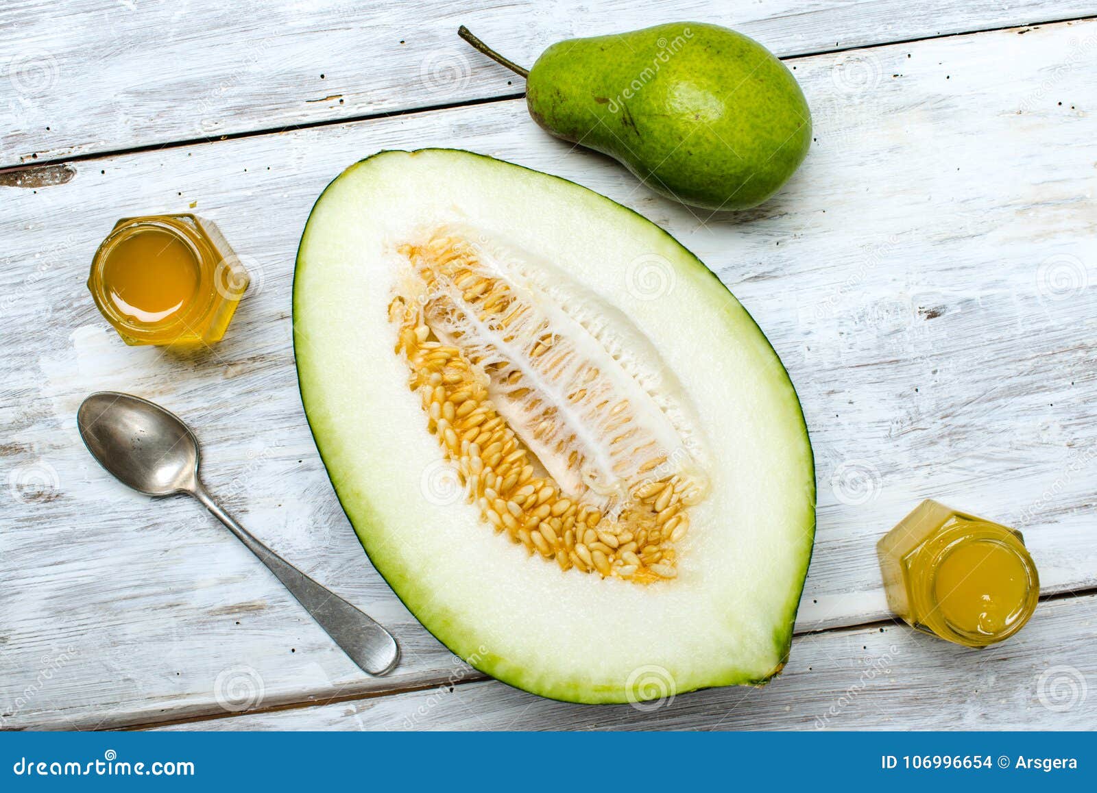 Tasty Pear with Melon and Honey on Rustic Board Stock Photo - Image of ...
