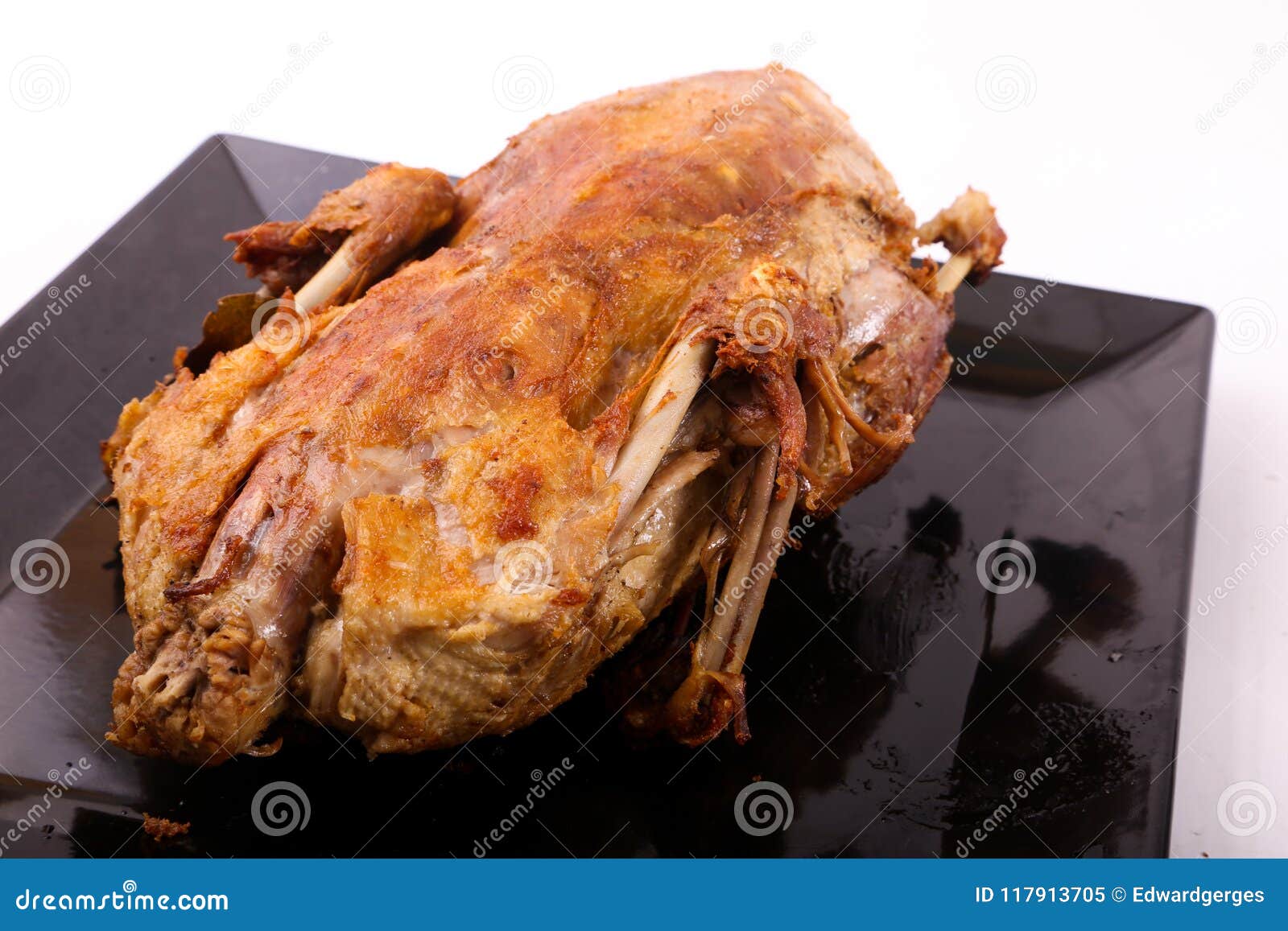Roasted Duck on a Plate stock image. Image of dinner - 117913705