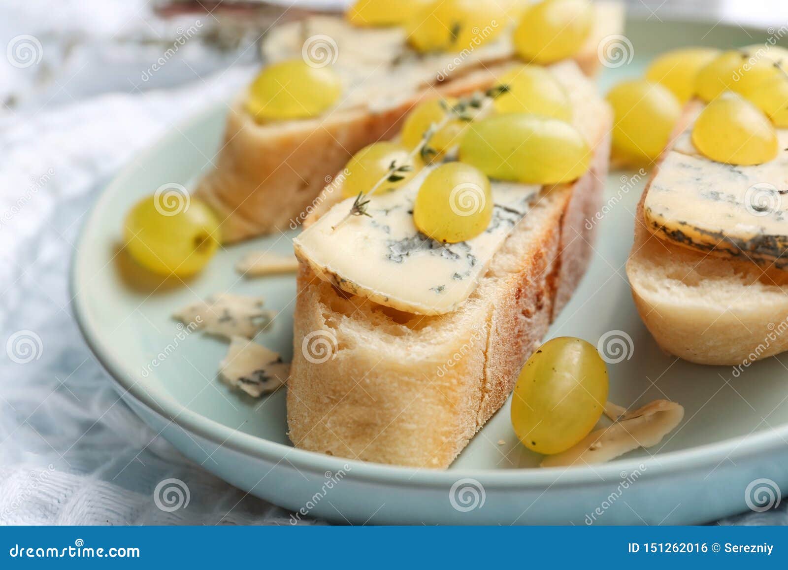 Tasty Sandwiches with Cheese and Grape on Plate Stock Photo - Image of ...