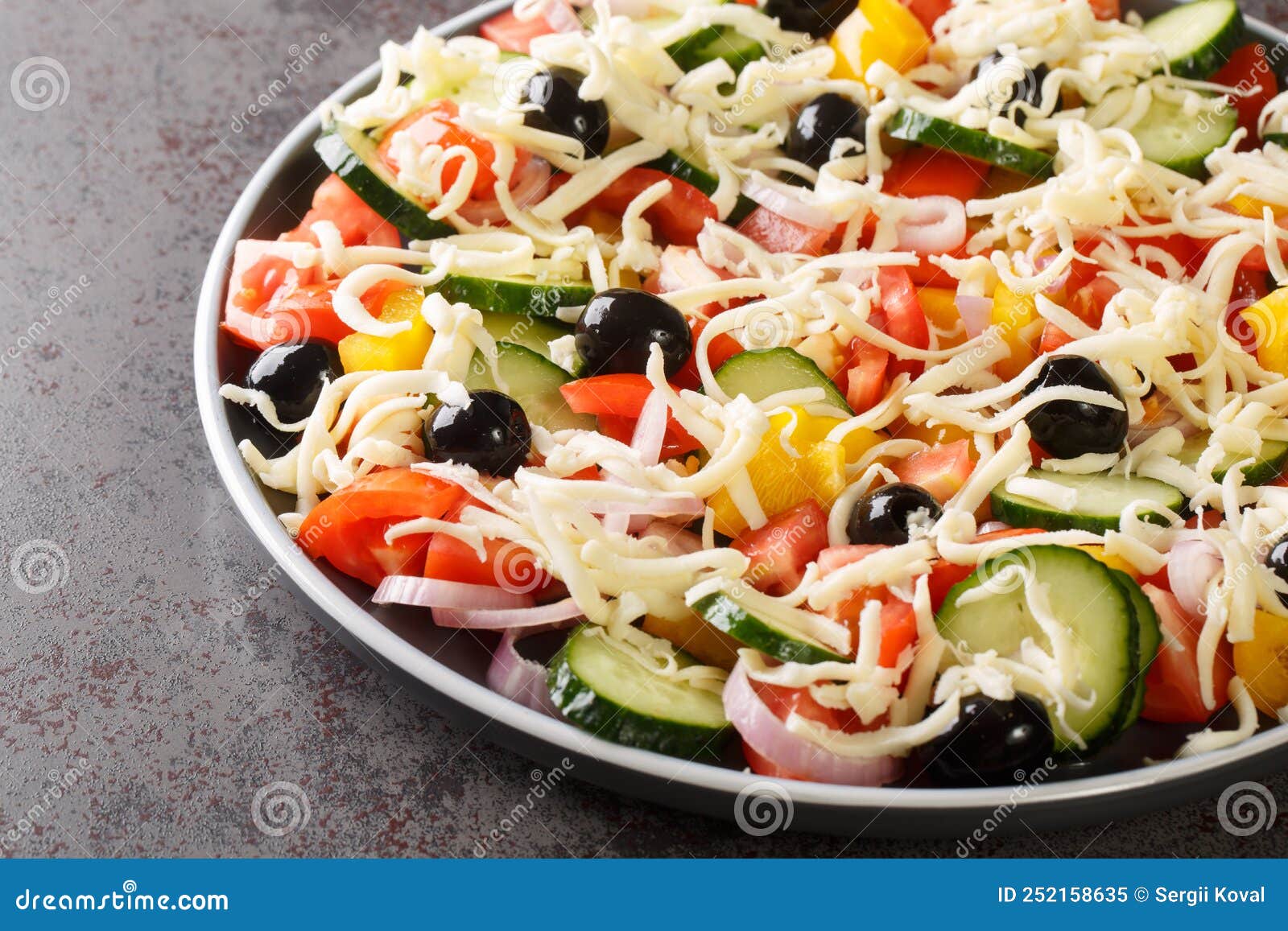 Tasty Shopska or Sopska Salata with Vegetables and Cheese Closeup in ...