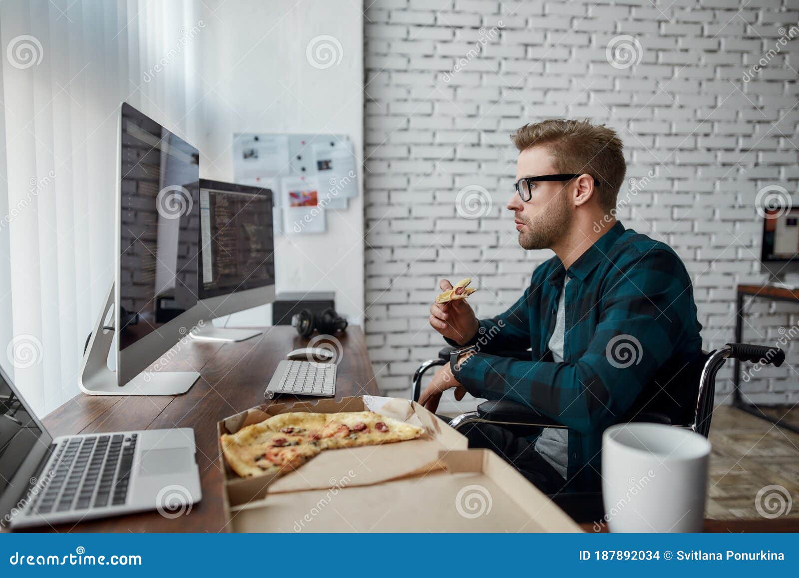 So Tasty. Side View of Caucasian Male Web Developer in a Wheelchair ...